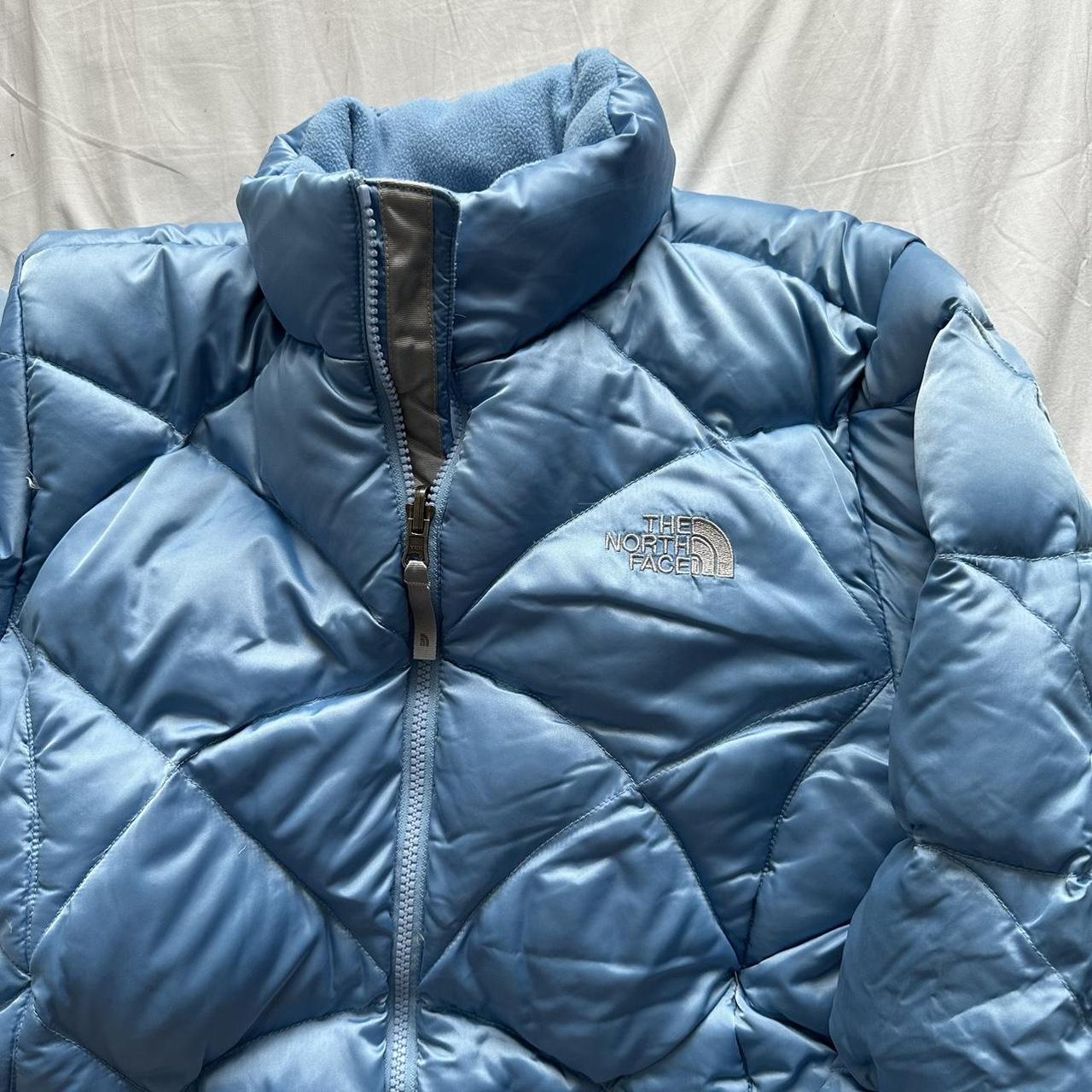 the north face light blue quilted puffer... | Depop