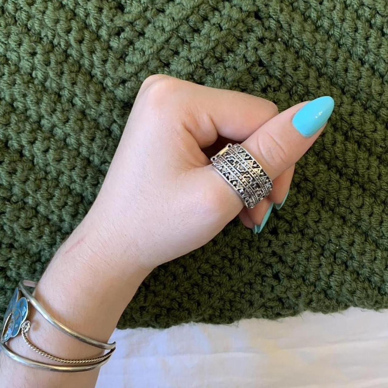 Vintage silver tone cuff ring with slinky elastic... | Depop