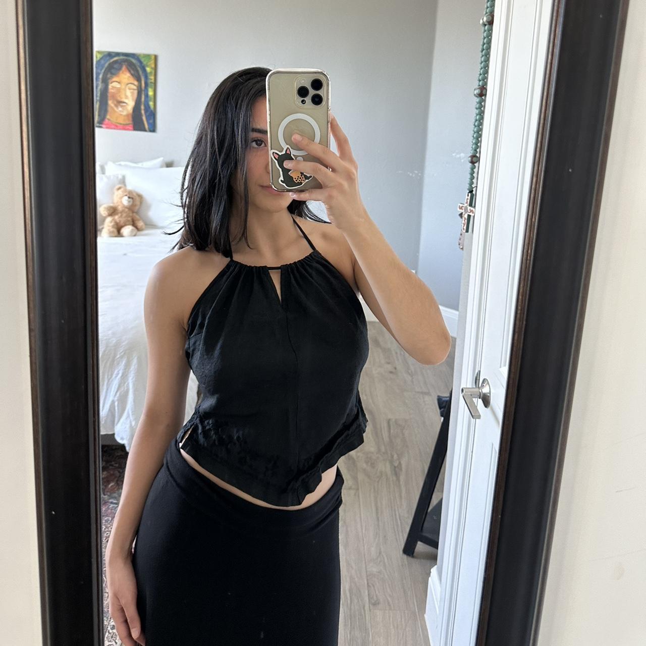 black backless halter neck top by the limited size... - Depop