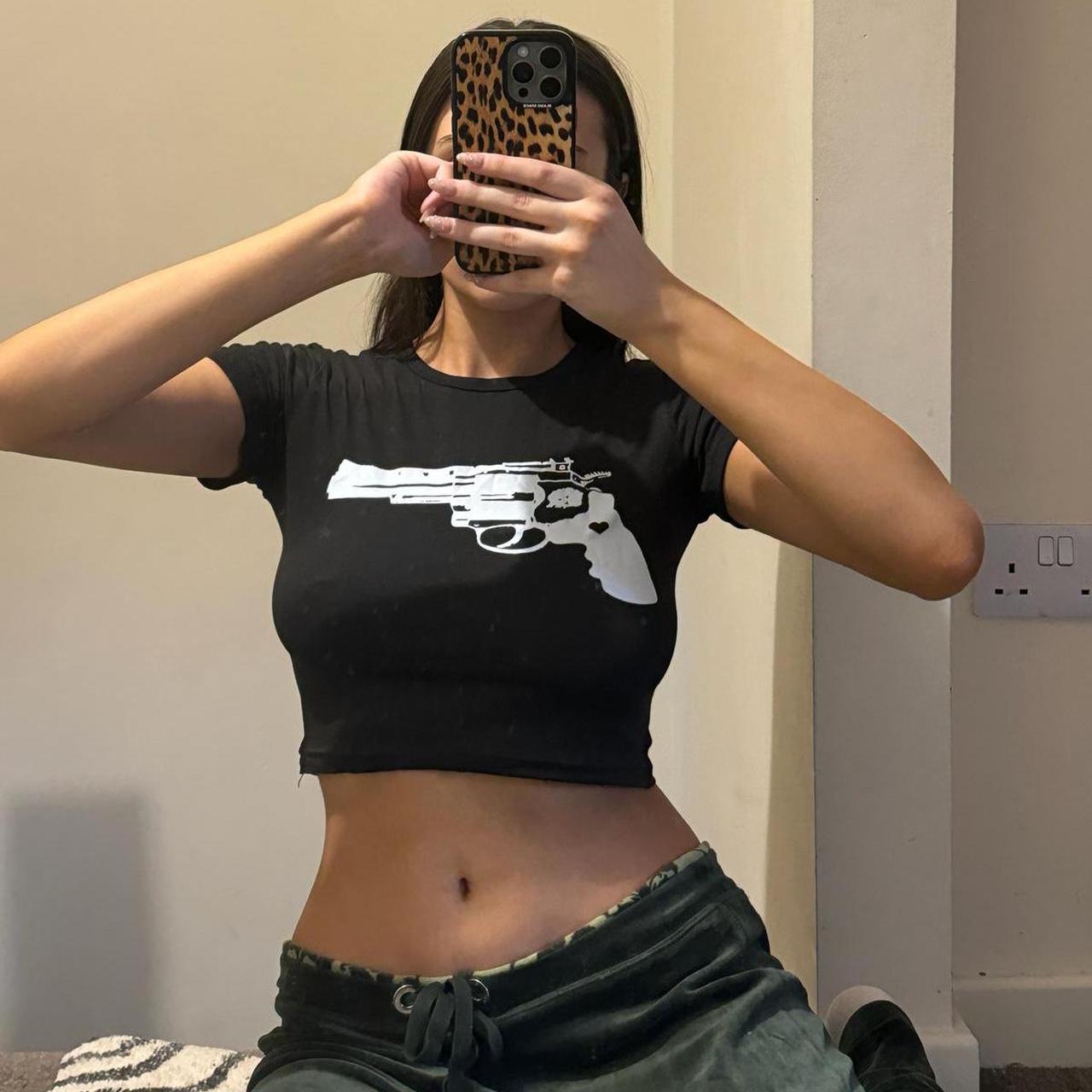 White printed gun crop top Small: Length -... - Depop