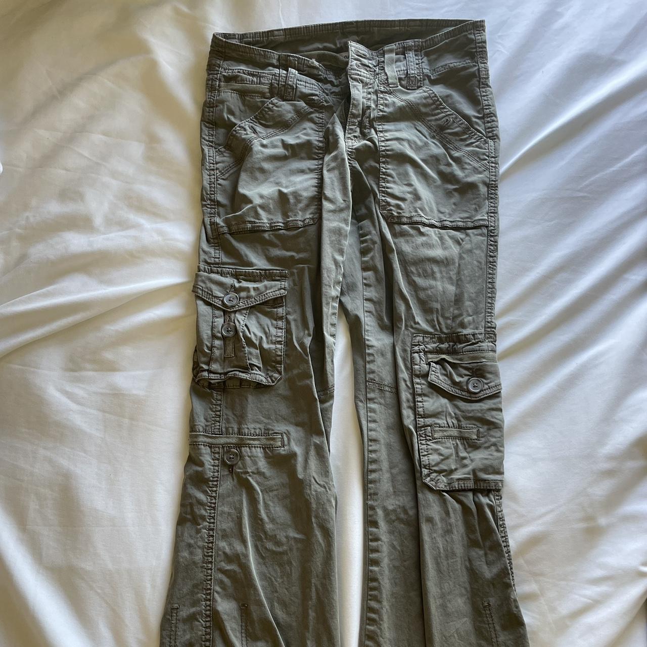 Garage green cargo pants. one of the belt loops has... - Depop