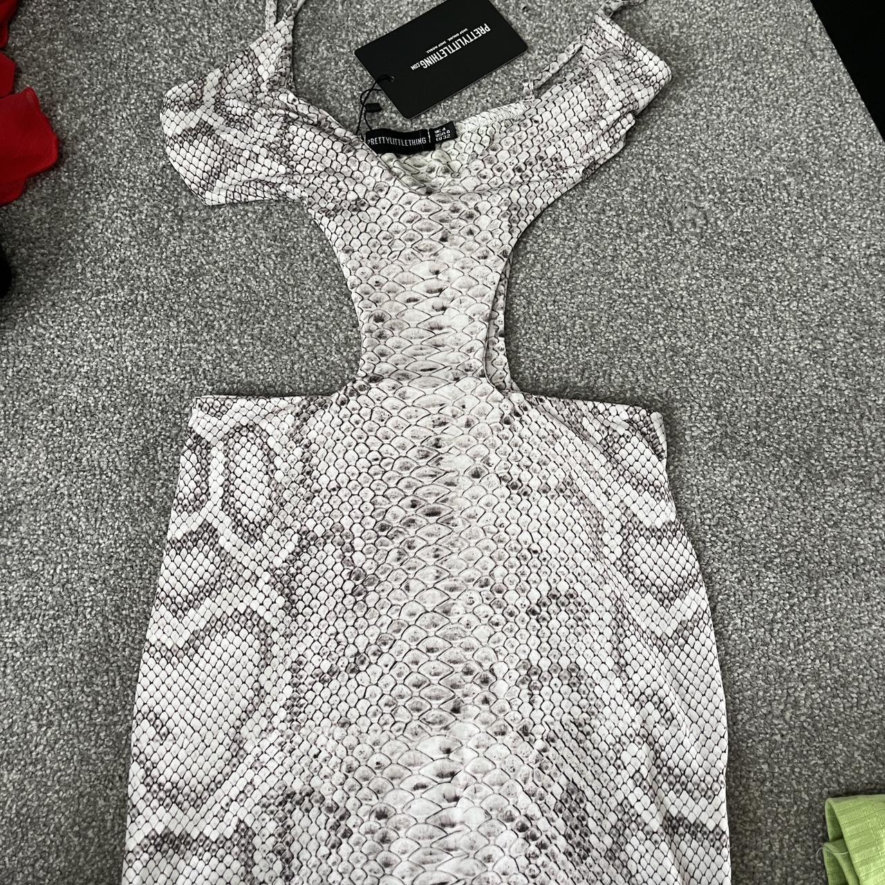 Grey snake plunge cut out mini dress. Size 4. Brand... - Depop