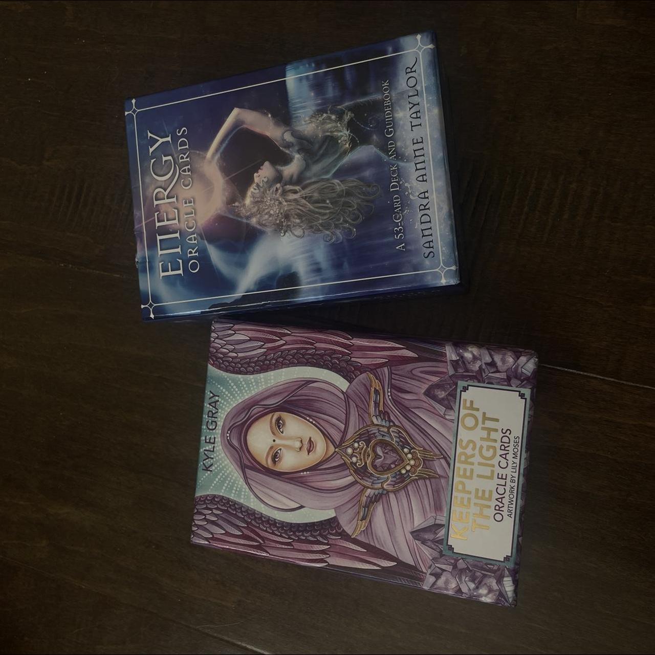 Oracle cards set both comes with guidebooks... - Depop
