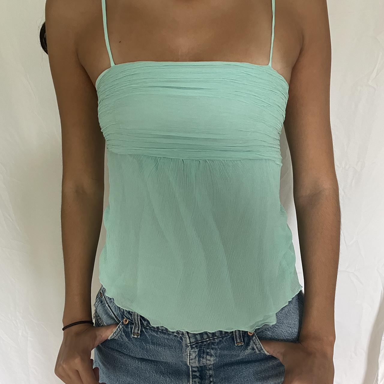 Flowy aqua tank top with zipper on the side. Fits a... - Depop
