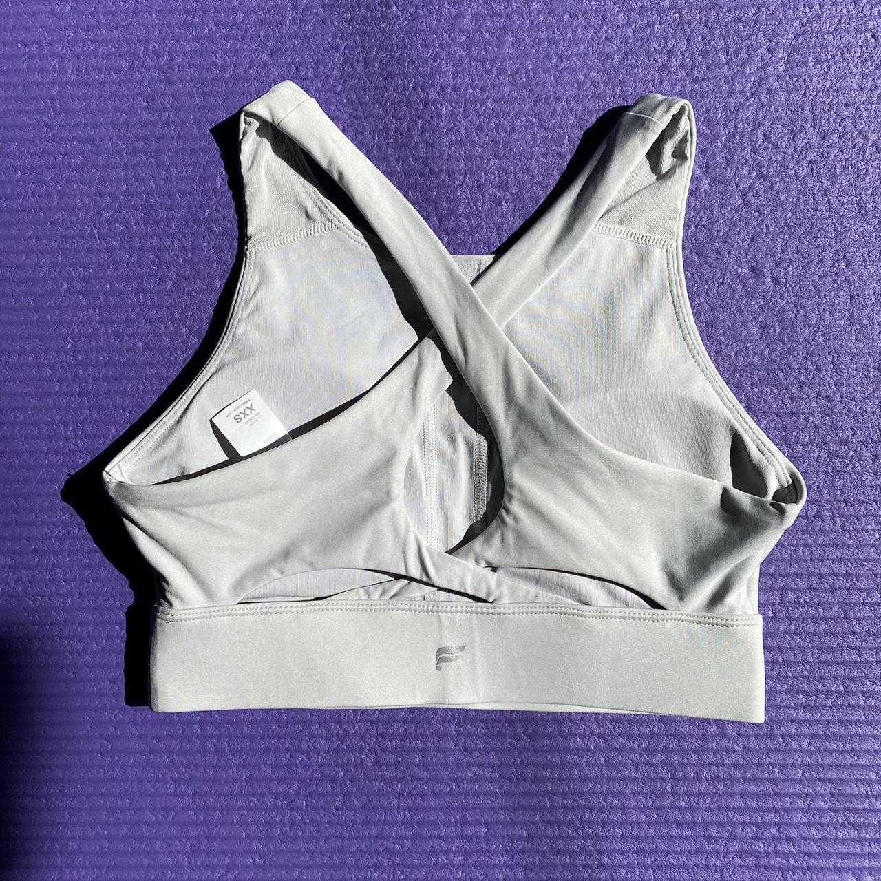 Fabletics grey white sports bra Shipping is with... - Depop