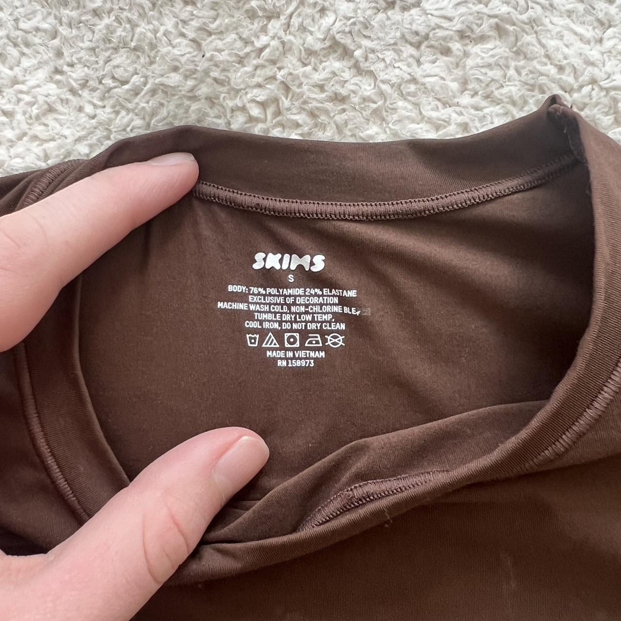 Skims cocoa brown soft smoothing tee shirt. Size s... - Depop