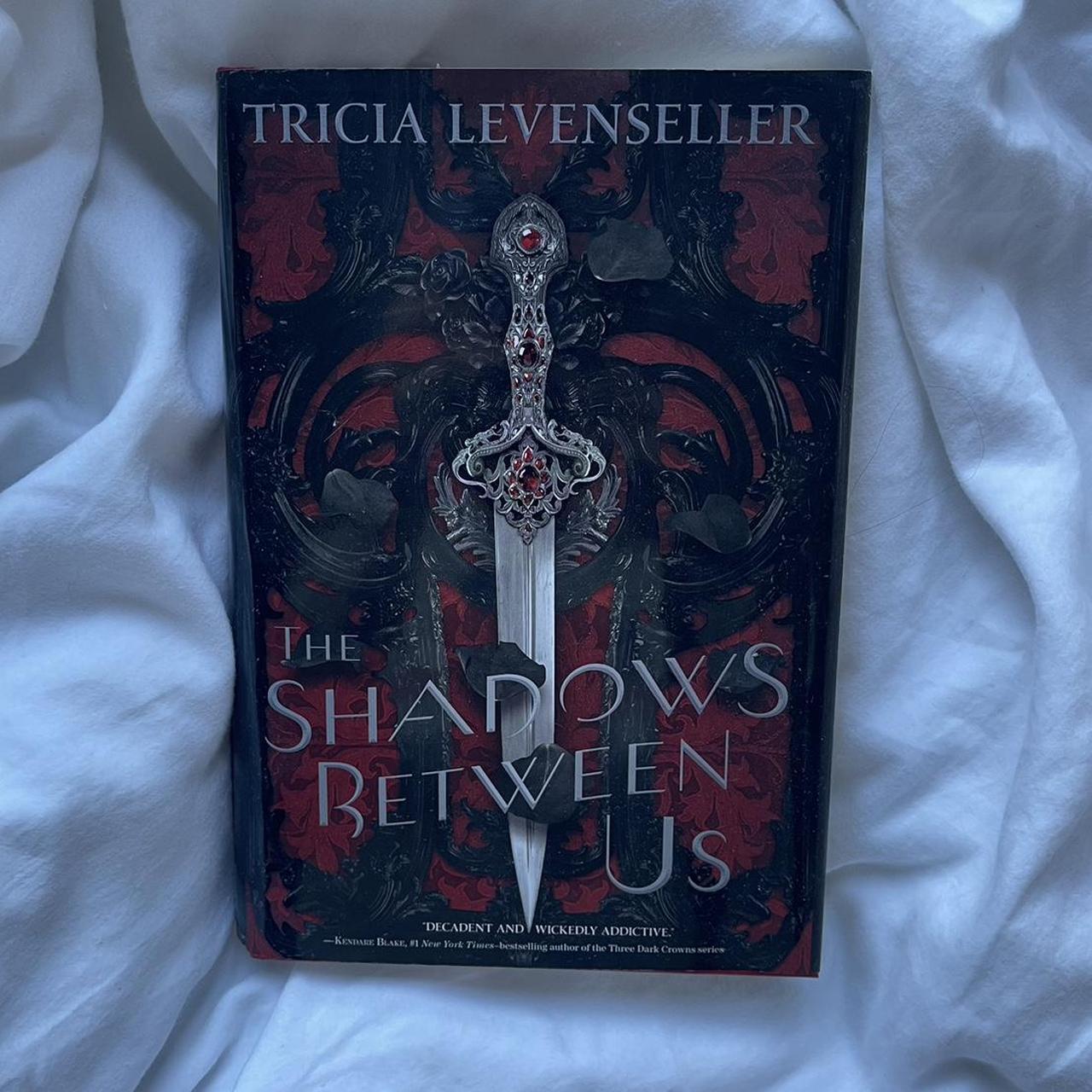 the shadows between us by tricia levenseller... - Depop