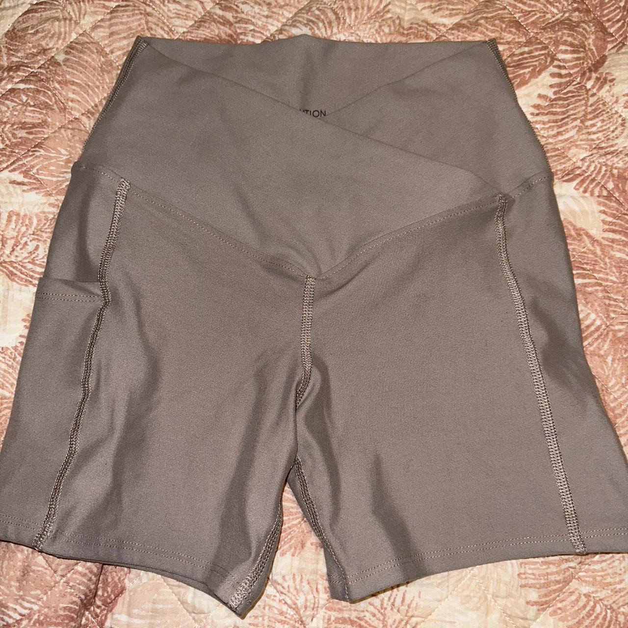 Best work out shorts with v cut in front will have... - Depop