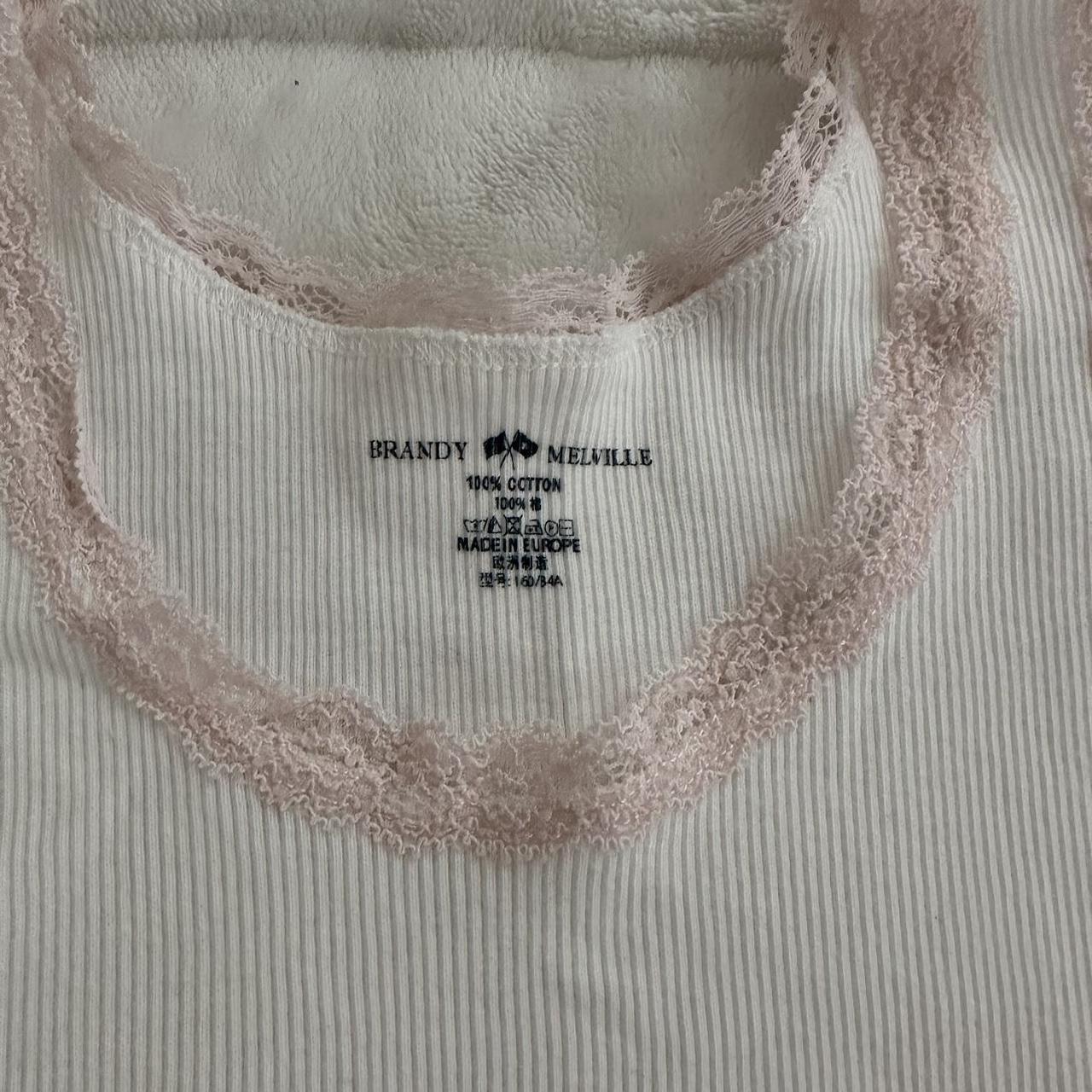 Brandy Melville white tank w pink lace trim. Never... - Depop