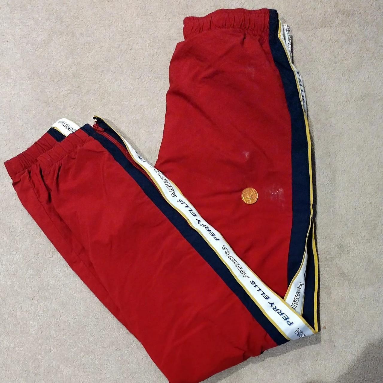 Men's Perry Ellis shell suit bottoms small defect as... - Depop