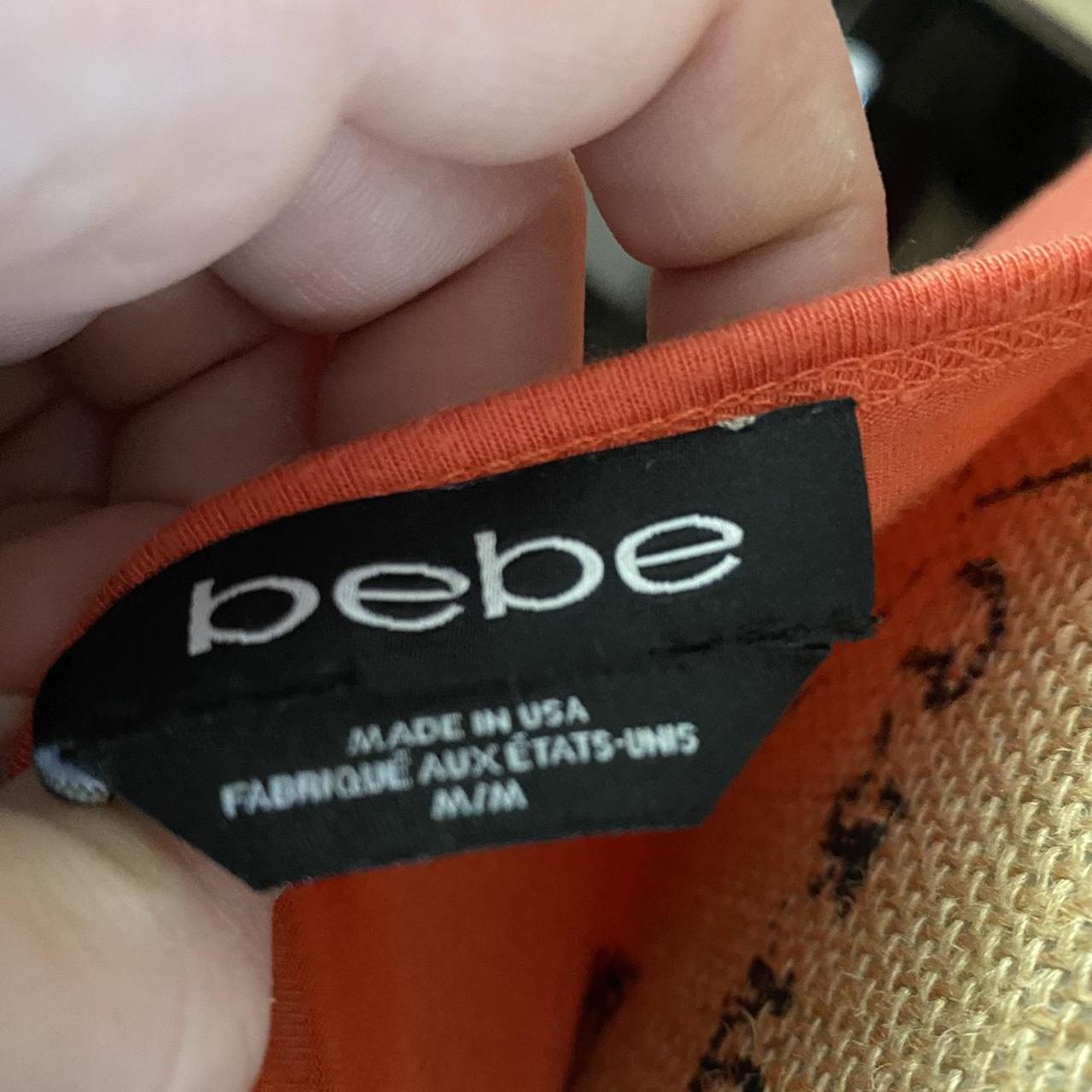 Adorable vintage pink bedazzled Bebe top with slit... - Depop