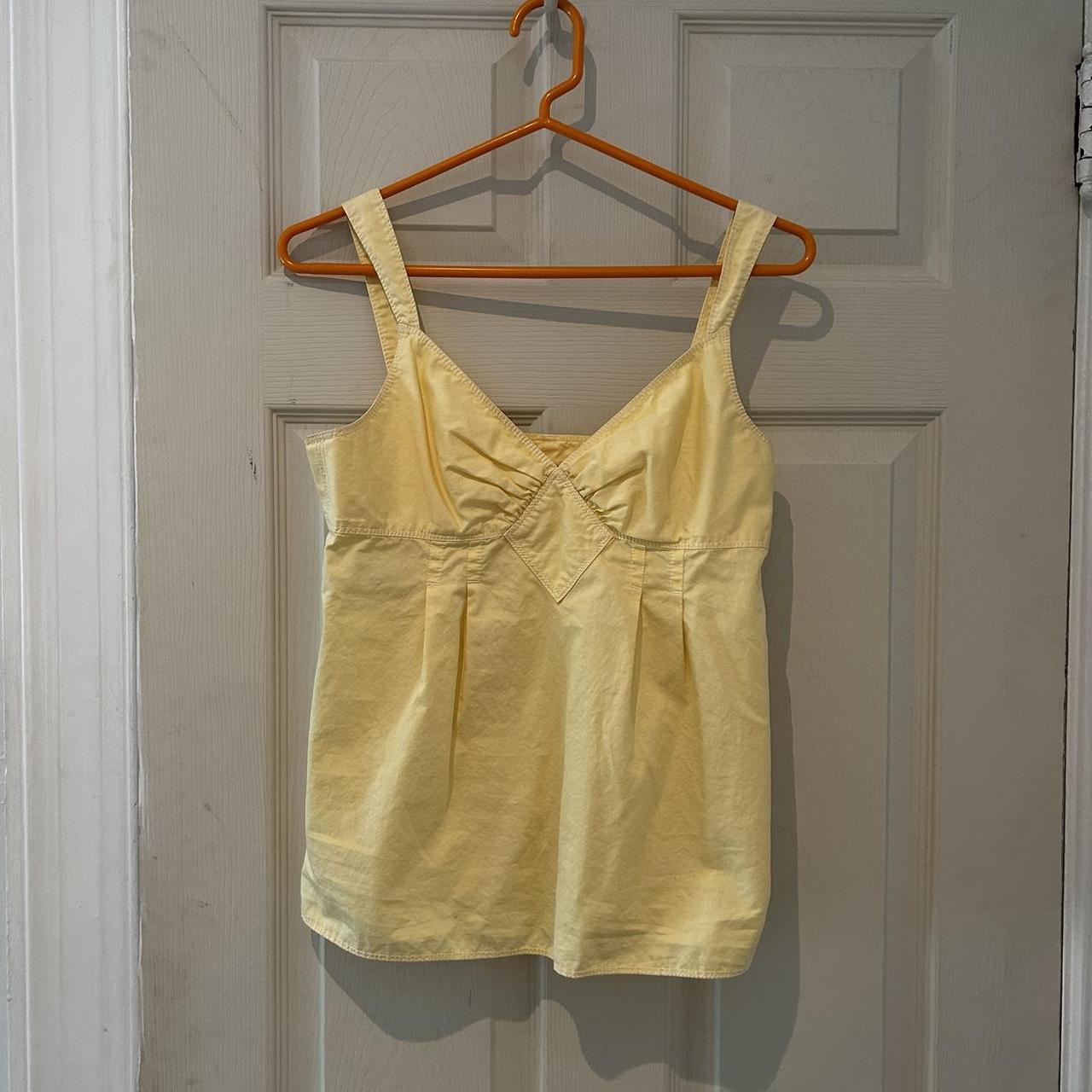 Adorable pale yellow tank top with structured... - Depop