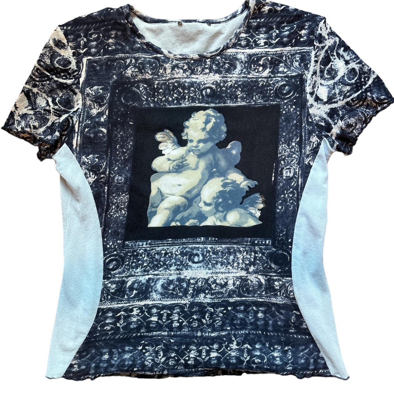 Blue and white micro mesh angel baby tee Sourced... - Depop
