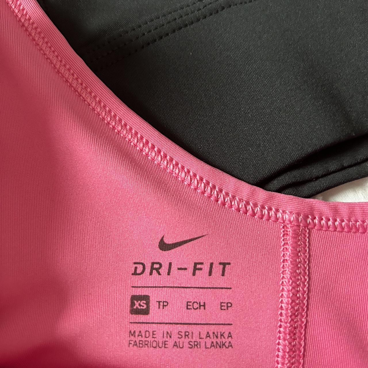 Pink Nike dri-fit sports bra Worn once but too... - Depop