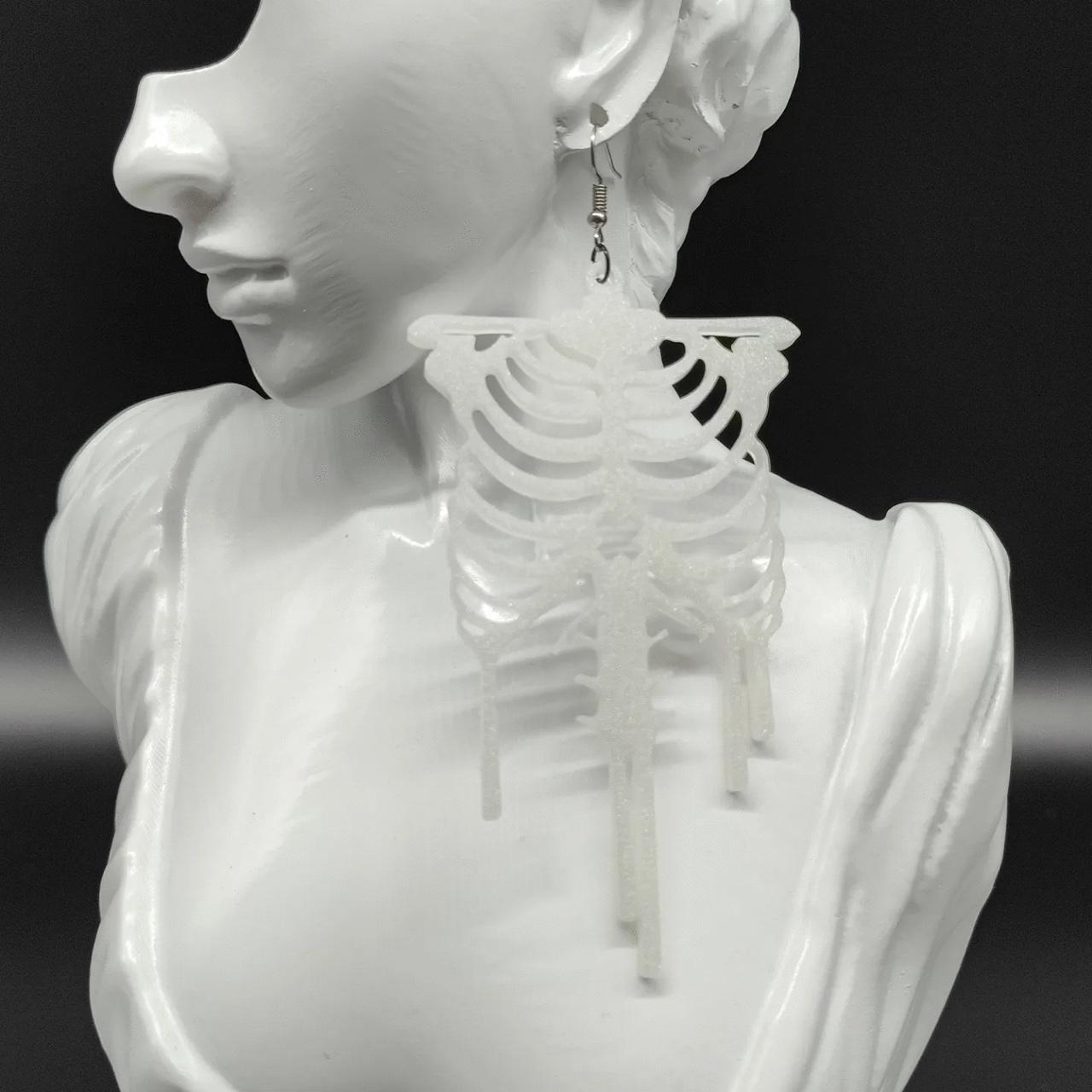 Bleeding rib cage earring pair in white. See 3rd pic... | Depop