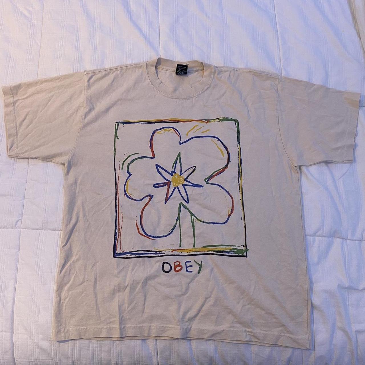 super cool obey shirt with flower graphic. only worn... - Depop