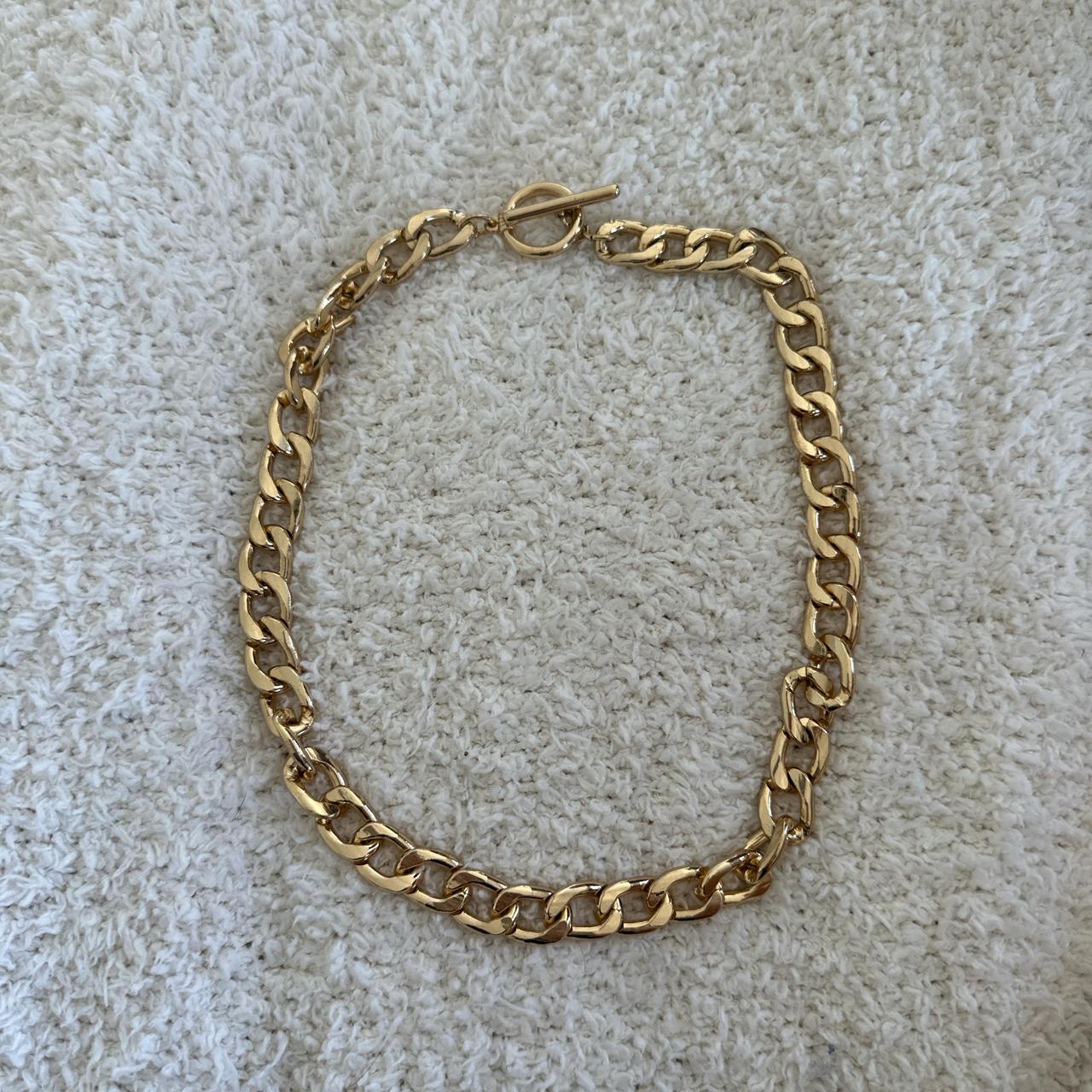Gold chain necklace with a clasp closure #jewellery... - Depop
