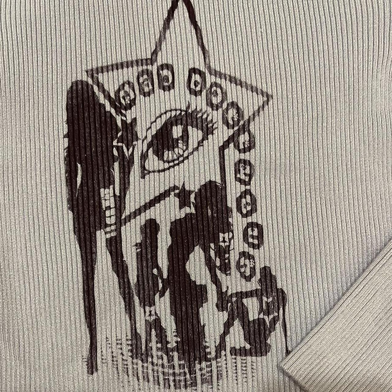 light blue ribbed sweater with screenprint... - Depop