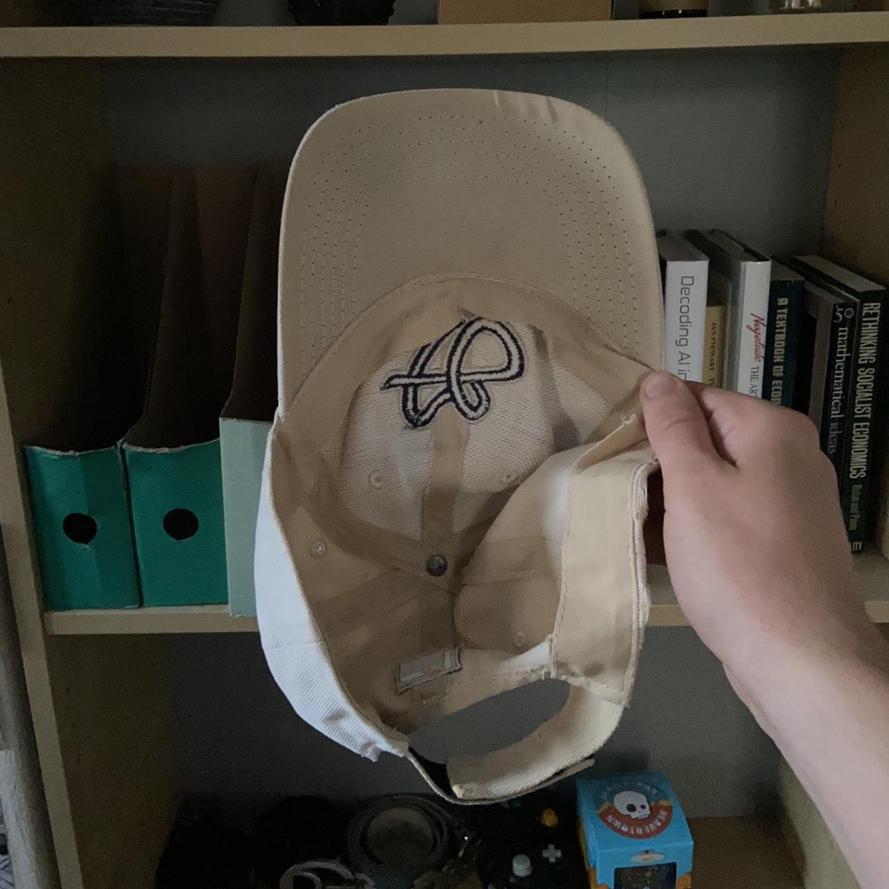 Vintage white fubu hat. Quite a lot of marks and... - Depop