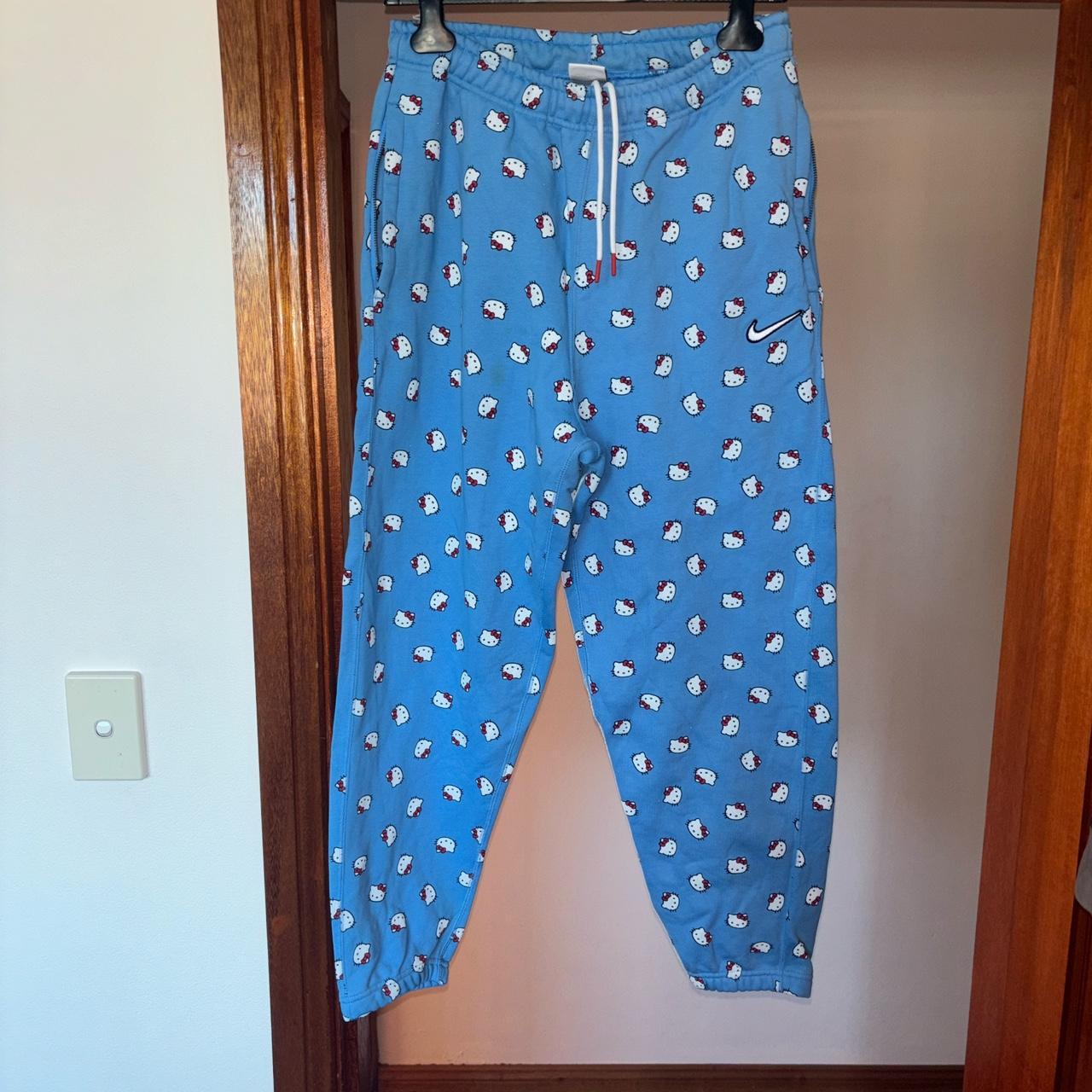 Hello kitty x Nike track pant Relaxed fit Size... - Depop