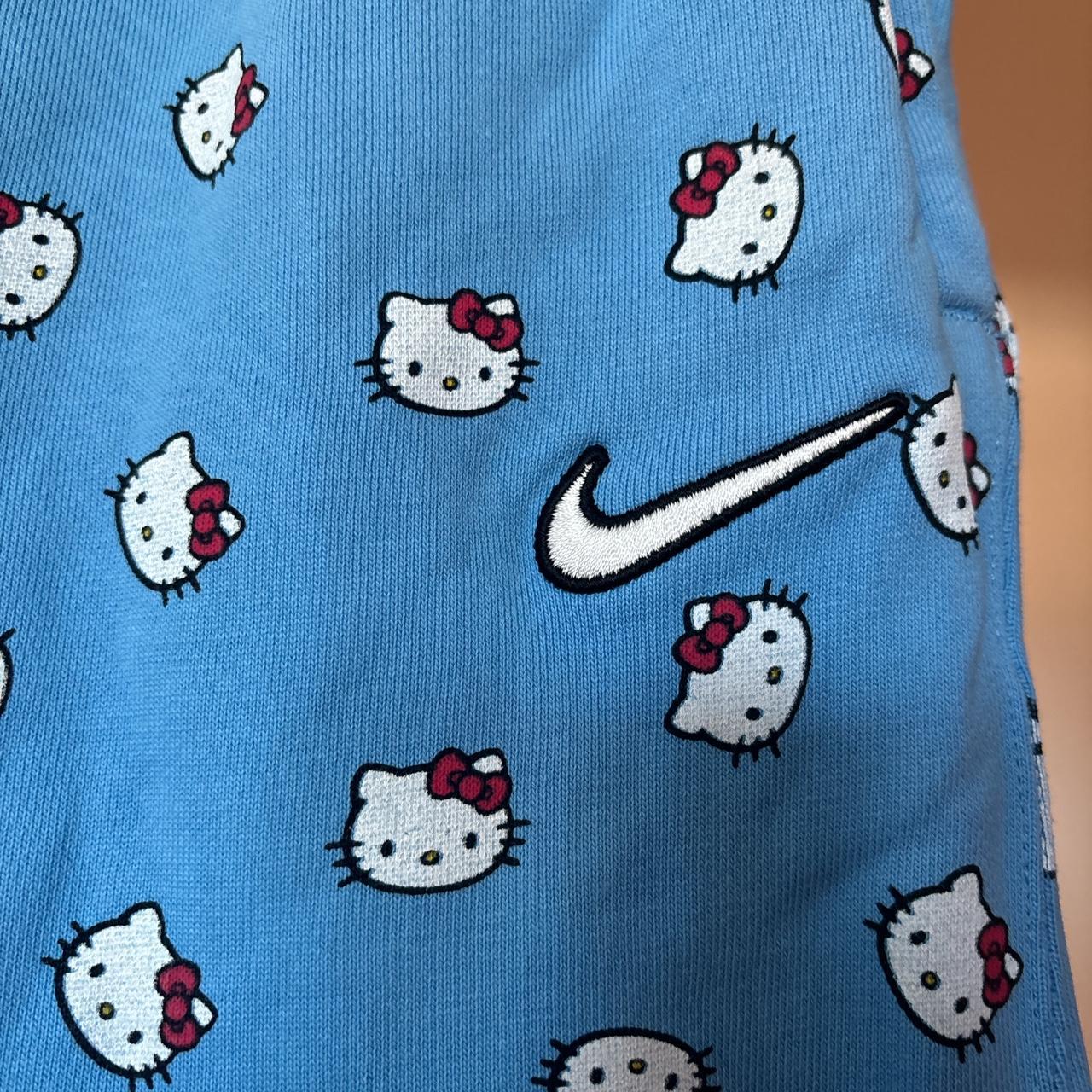 Hello kitty x Nike track pant Relaxed fit Size... - Depop