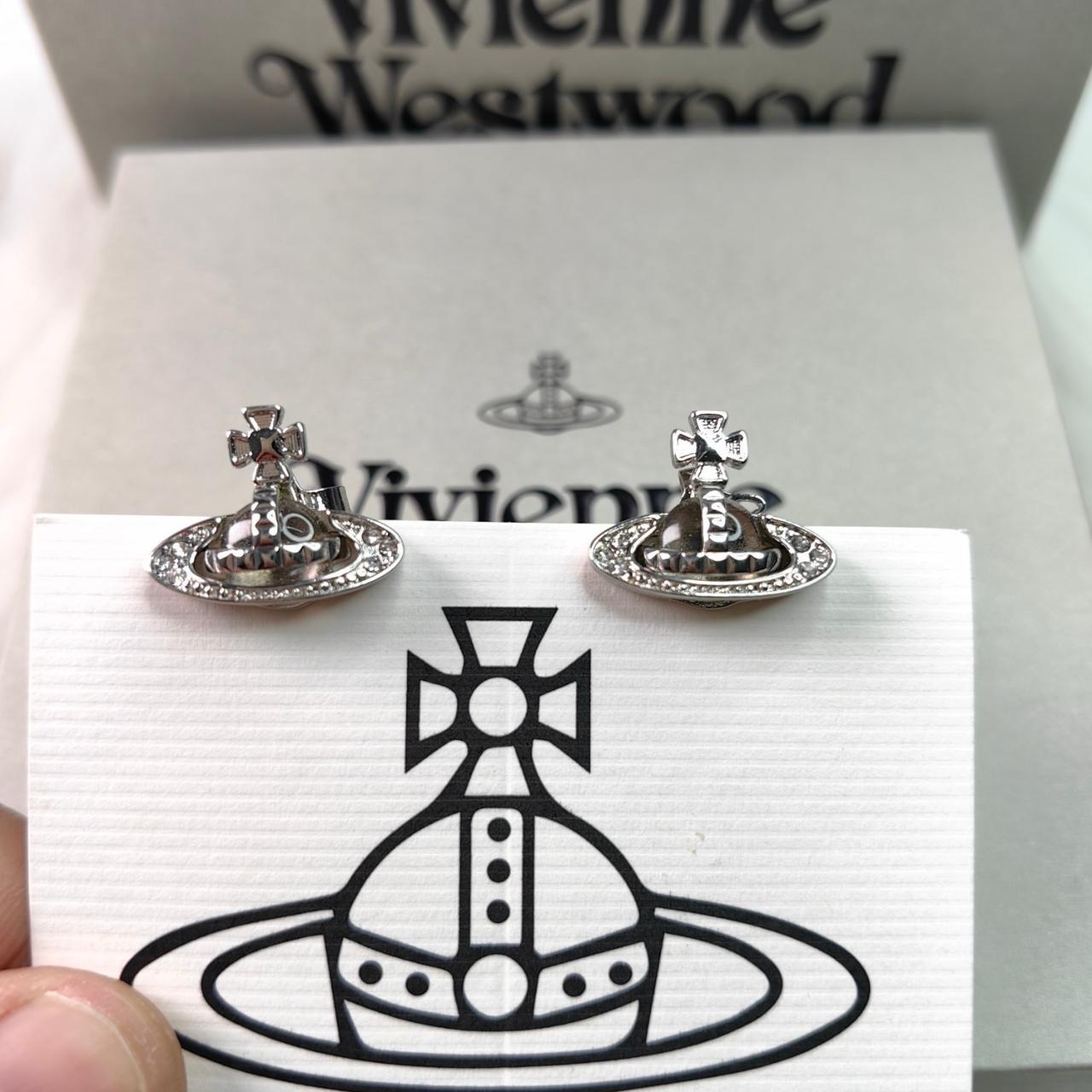 Vivian Queen Mother Pina half transparent ball earrings - Depop