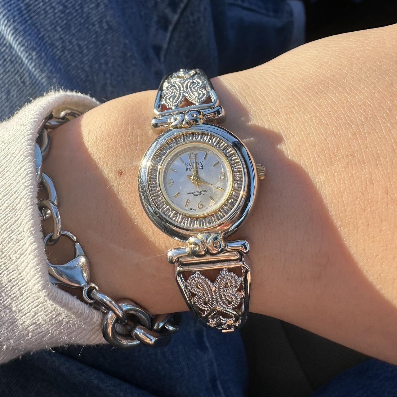 Silver and gold tone watch with regal detailing In... | Depop