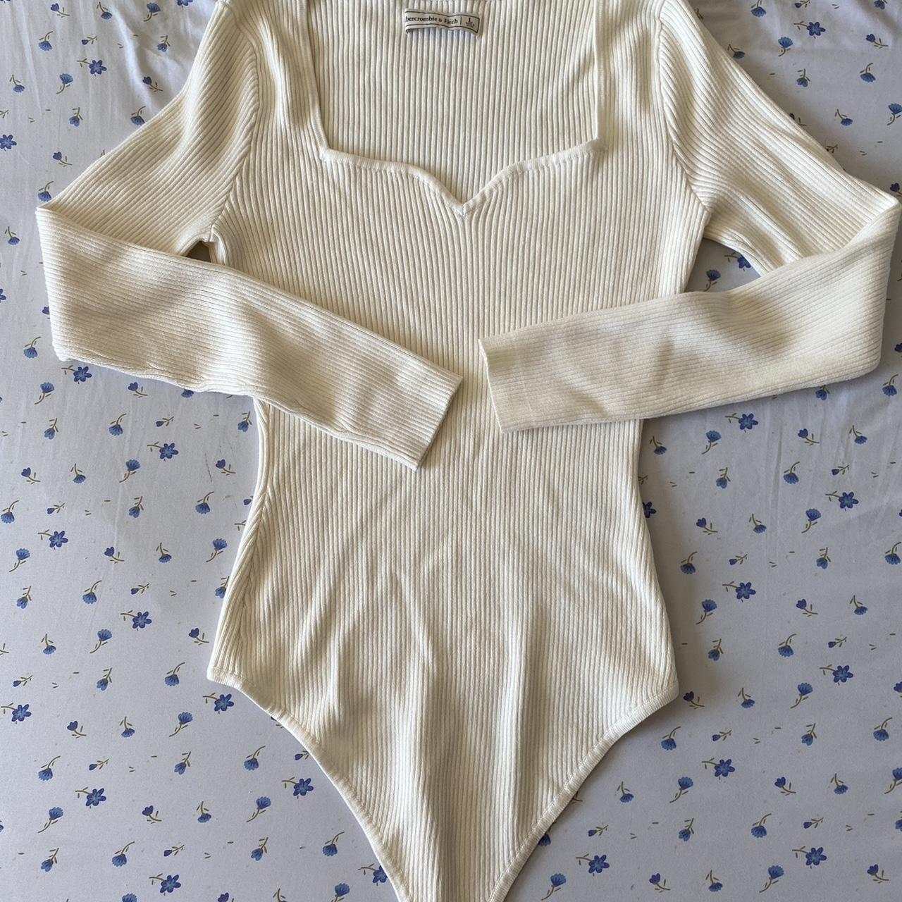 Off white long sleeve body suit Abercrombie&fitch... - Depop
