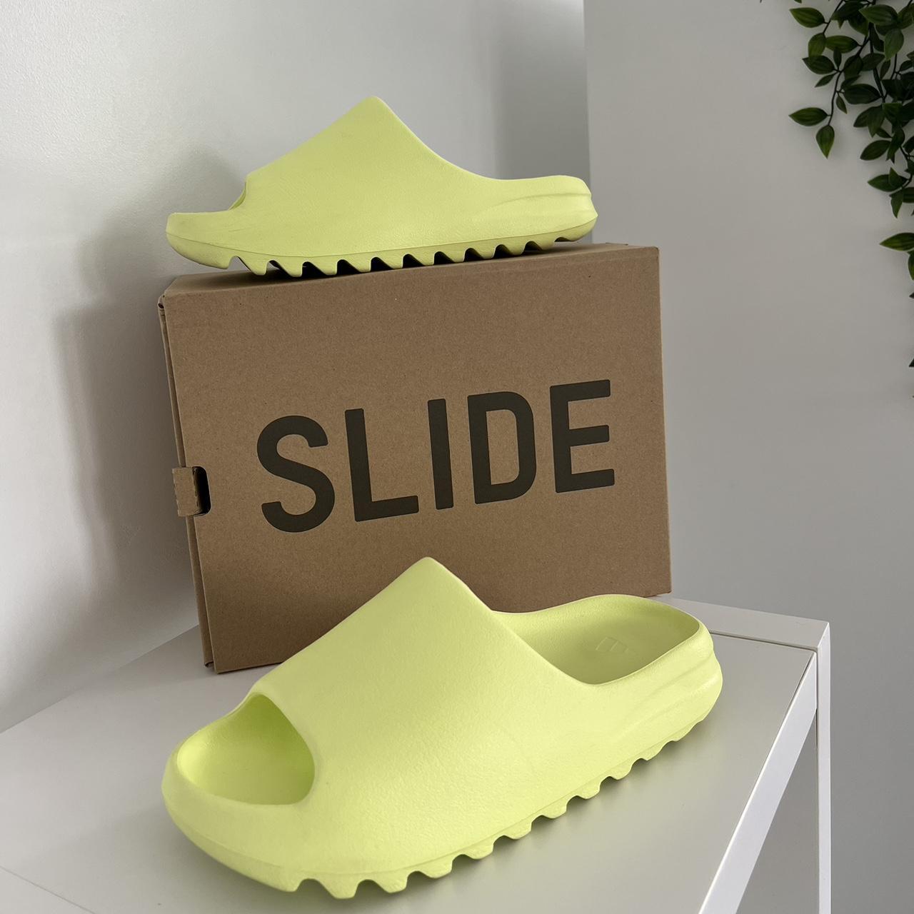 Neon yellow yezzy slides, worn a few times around... - Depop