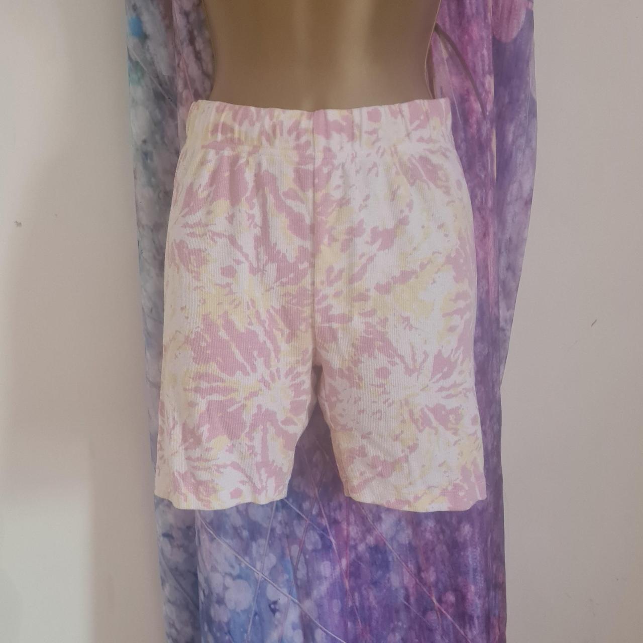 Handprint pastel yellow pink cycling shorts Size... - Depop