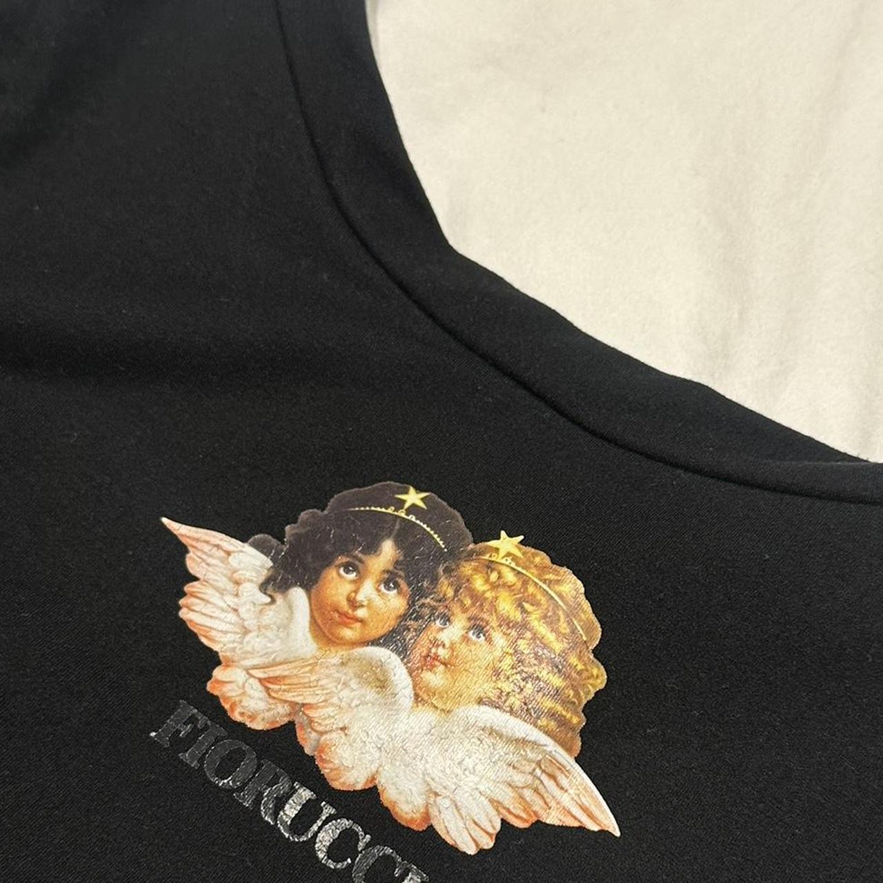 Fiorucci Women's Black and Cream Crop-top | Depop