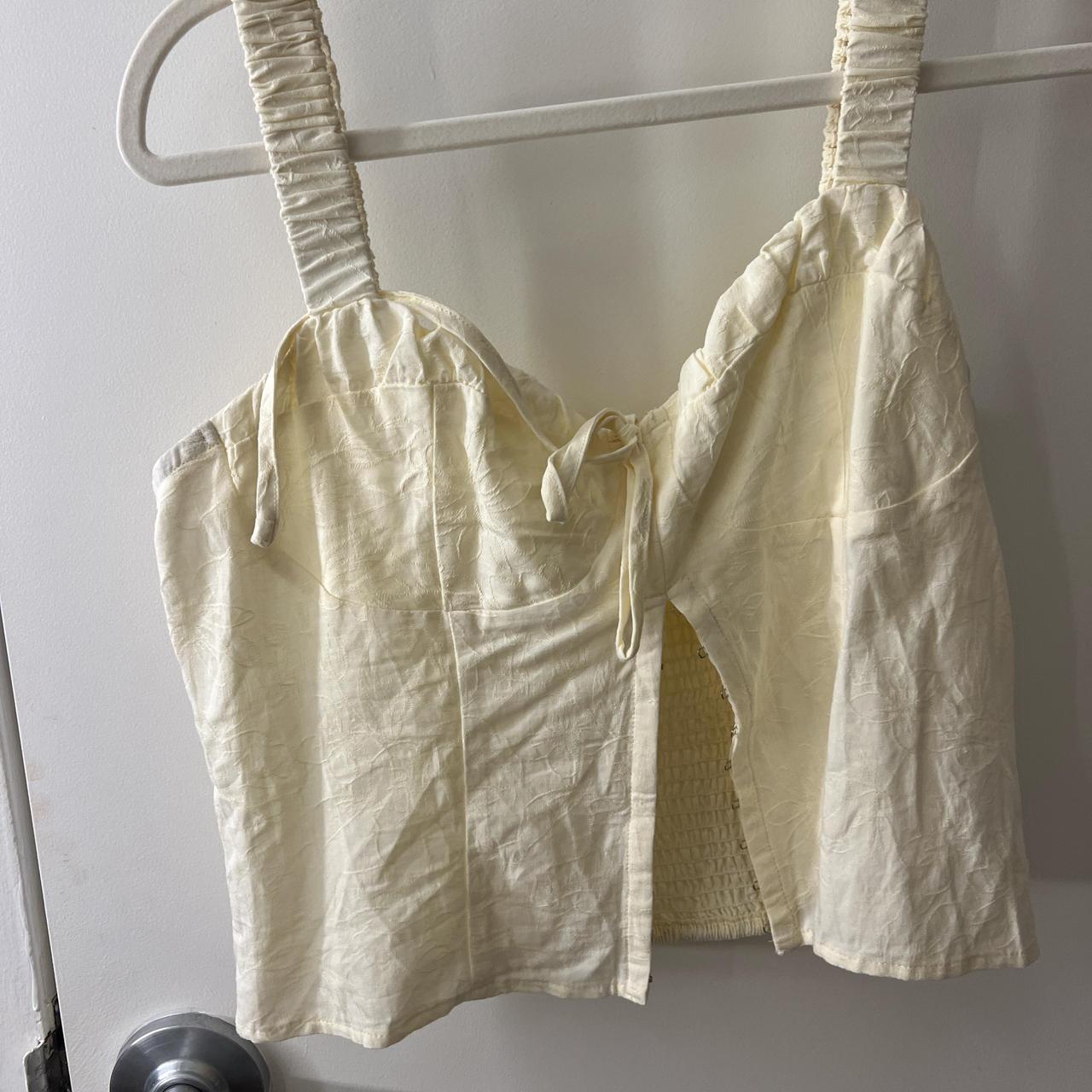 Cute yellow corset top! So perfect! Never worn! - Depop