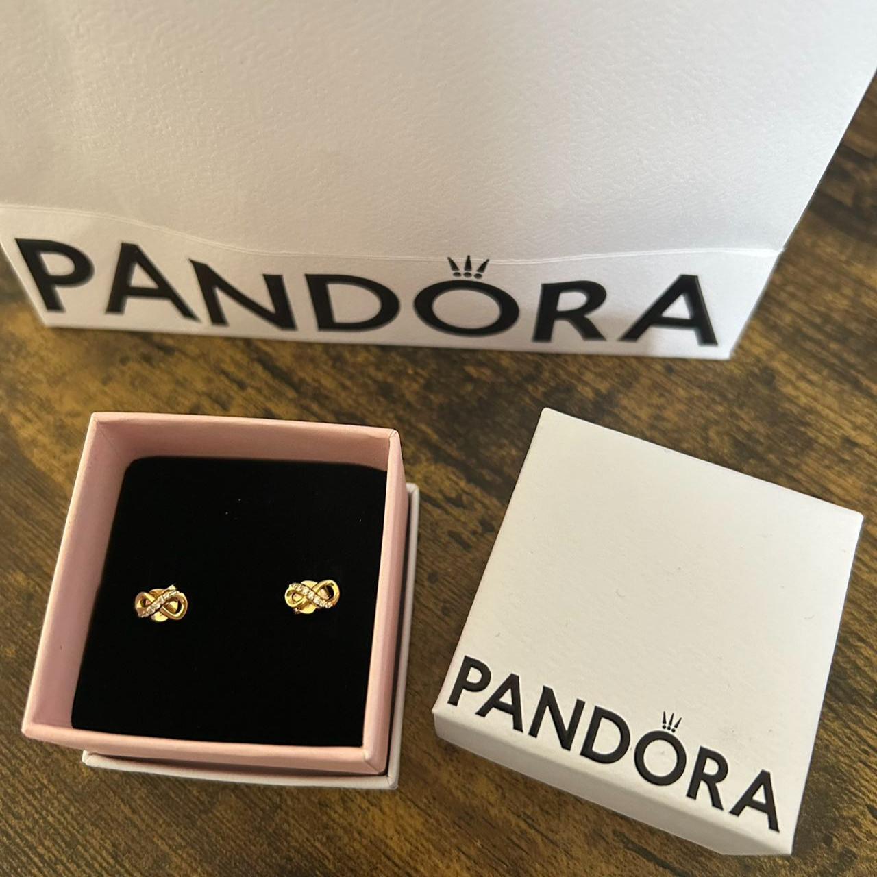 Pandora Sparkling Infinity Stud Earrings, gold... - Depop