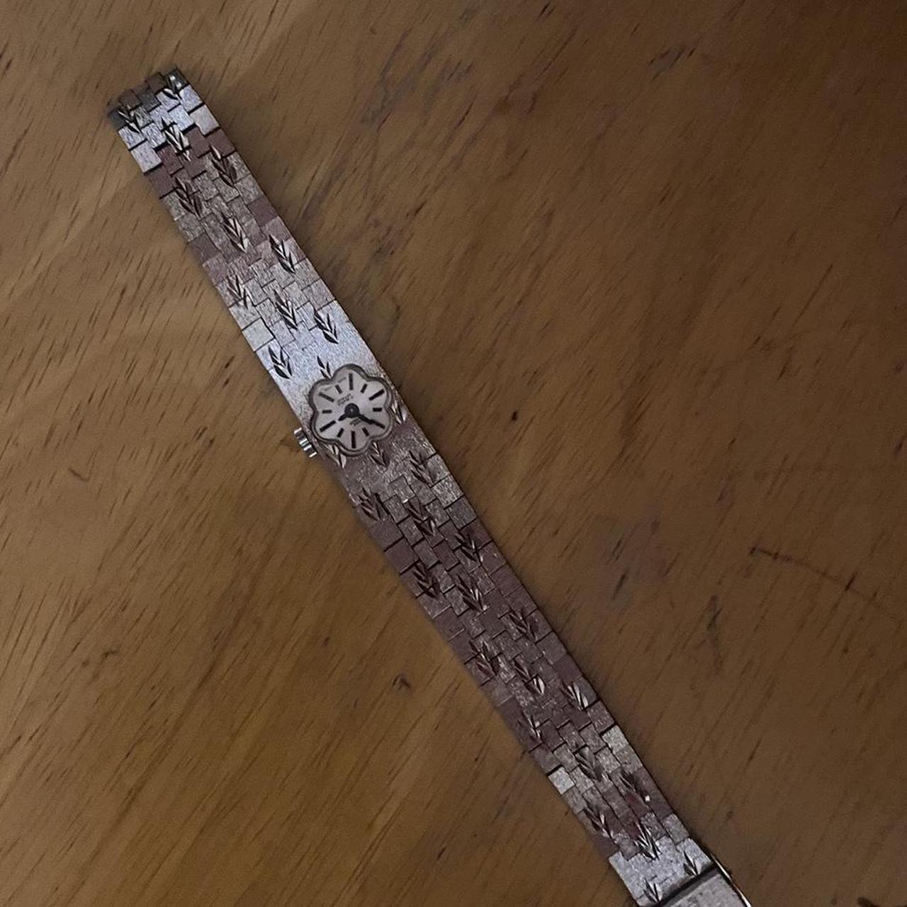 Beautiful silver watch with flower shaped face.... - Depop