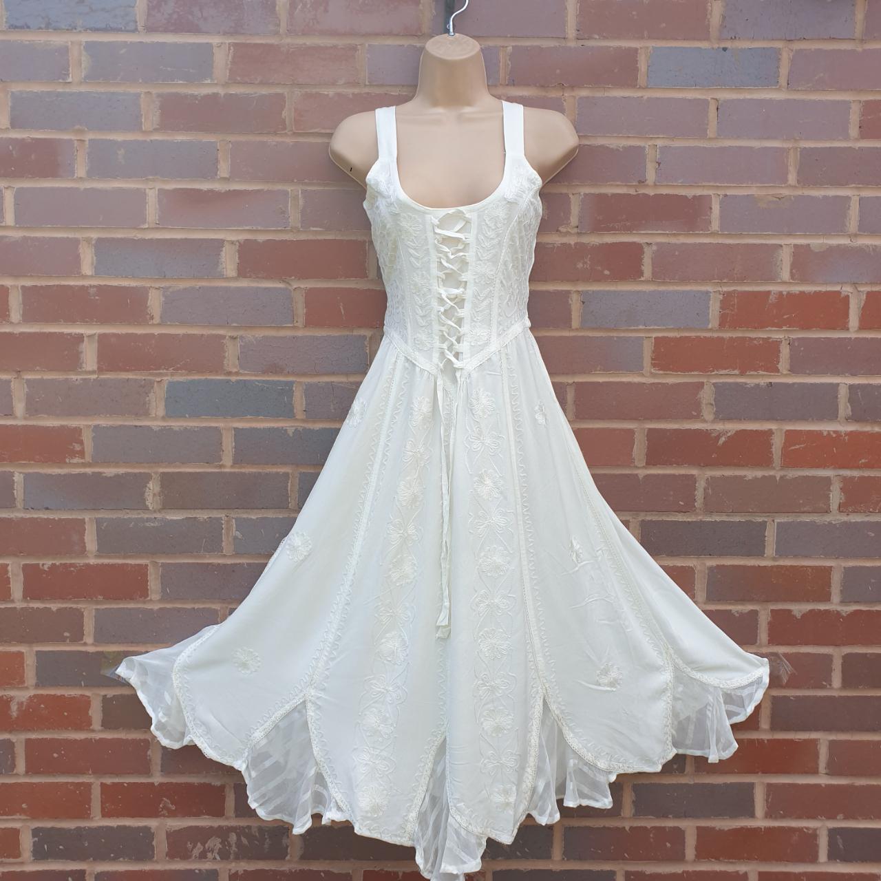 This stunning midi length Rayon fabric dress is... - Depop