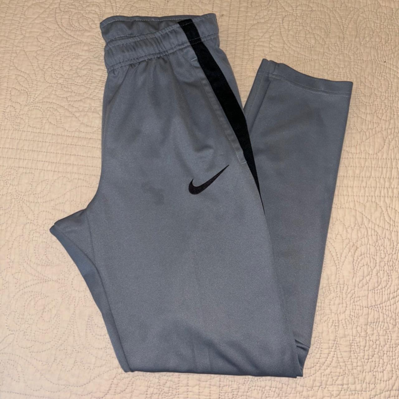 grey Nike workout pants small stains and mild... - Depop