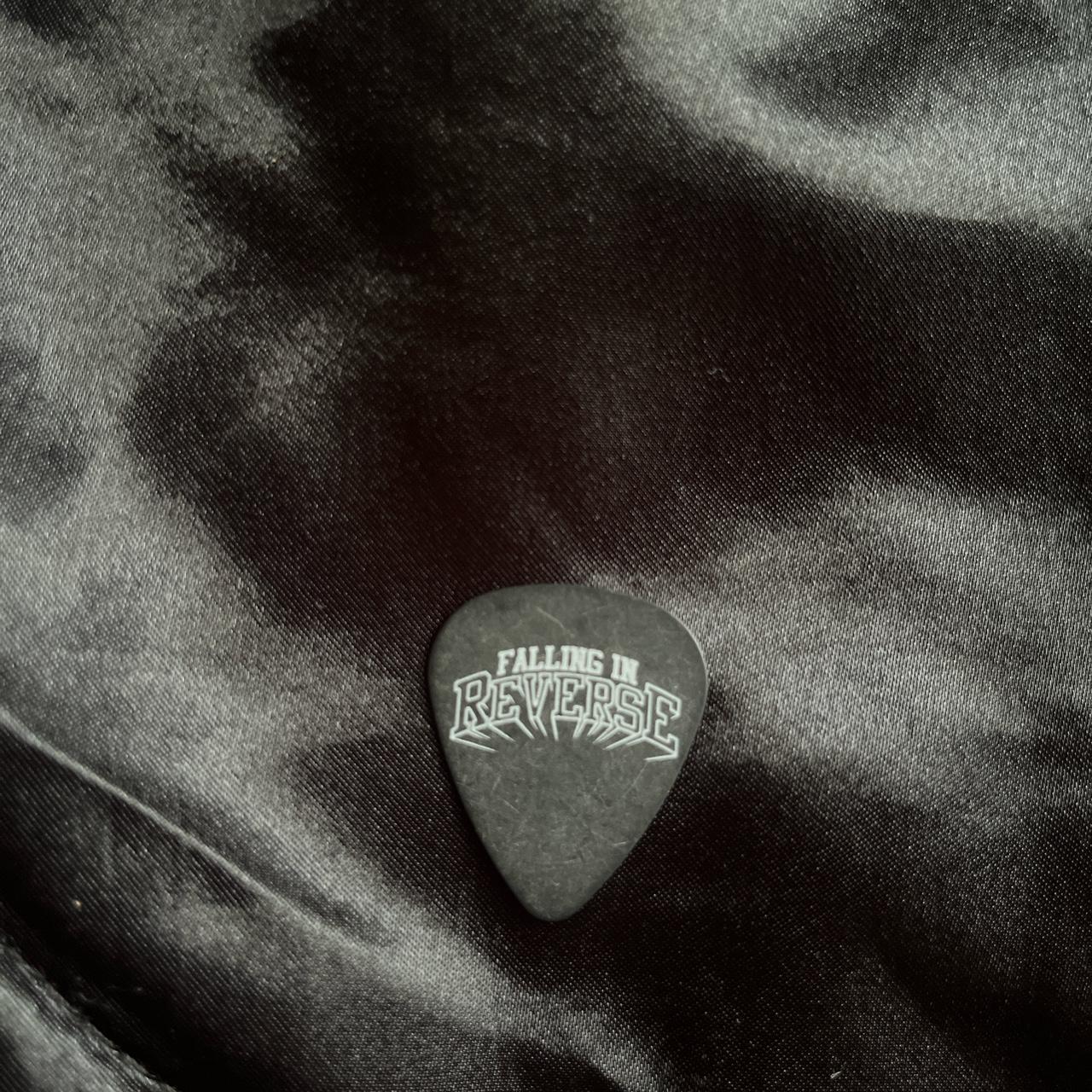 Falling in reverse guitar pick caught from Carolina... - Depop