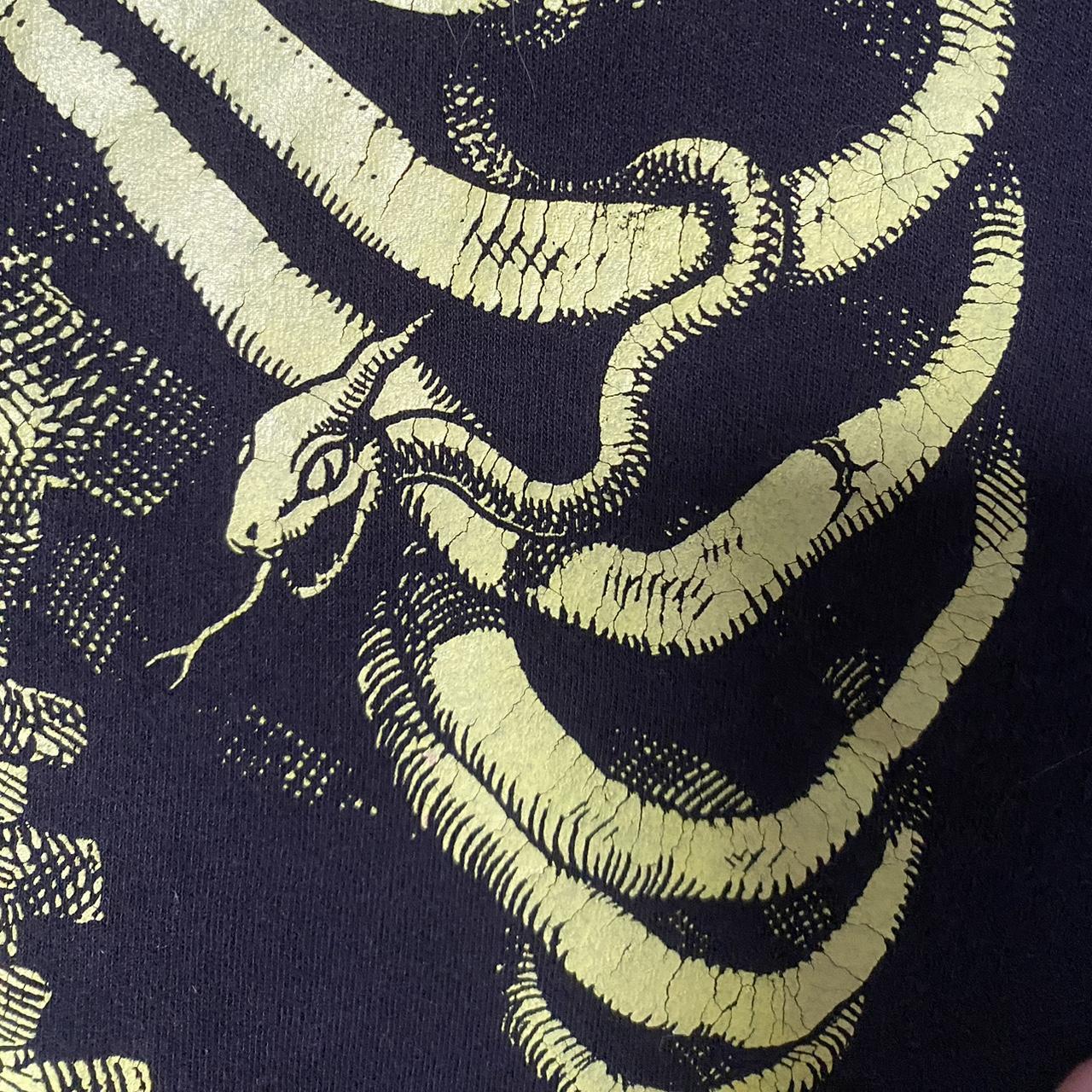 Omen skeleton rib cage and snake shirt Some flaws... - Depop