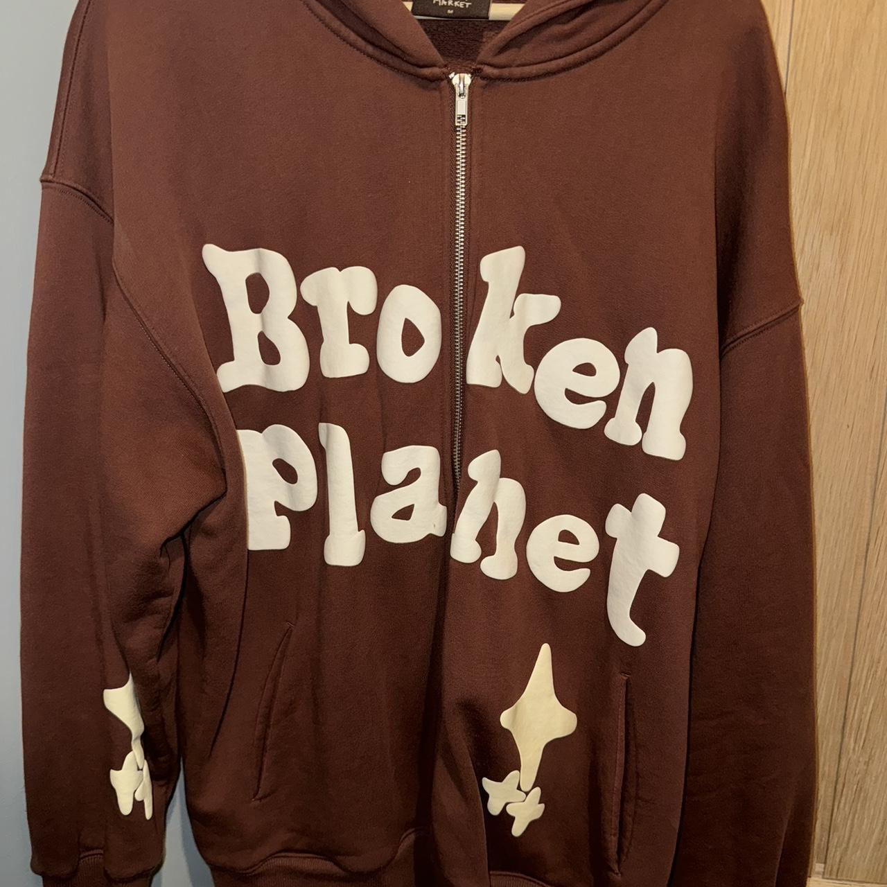 Broken planet lost in space zip up hoodie - Depop