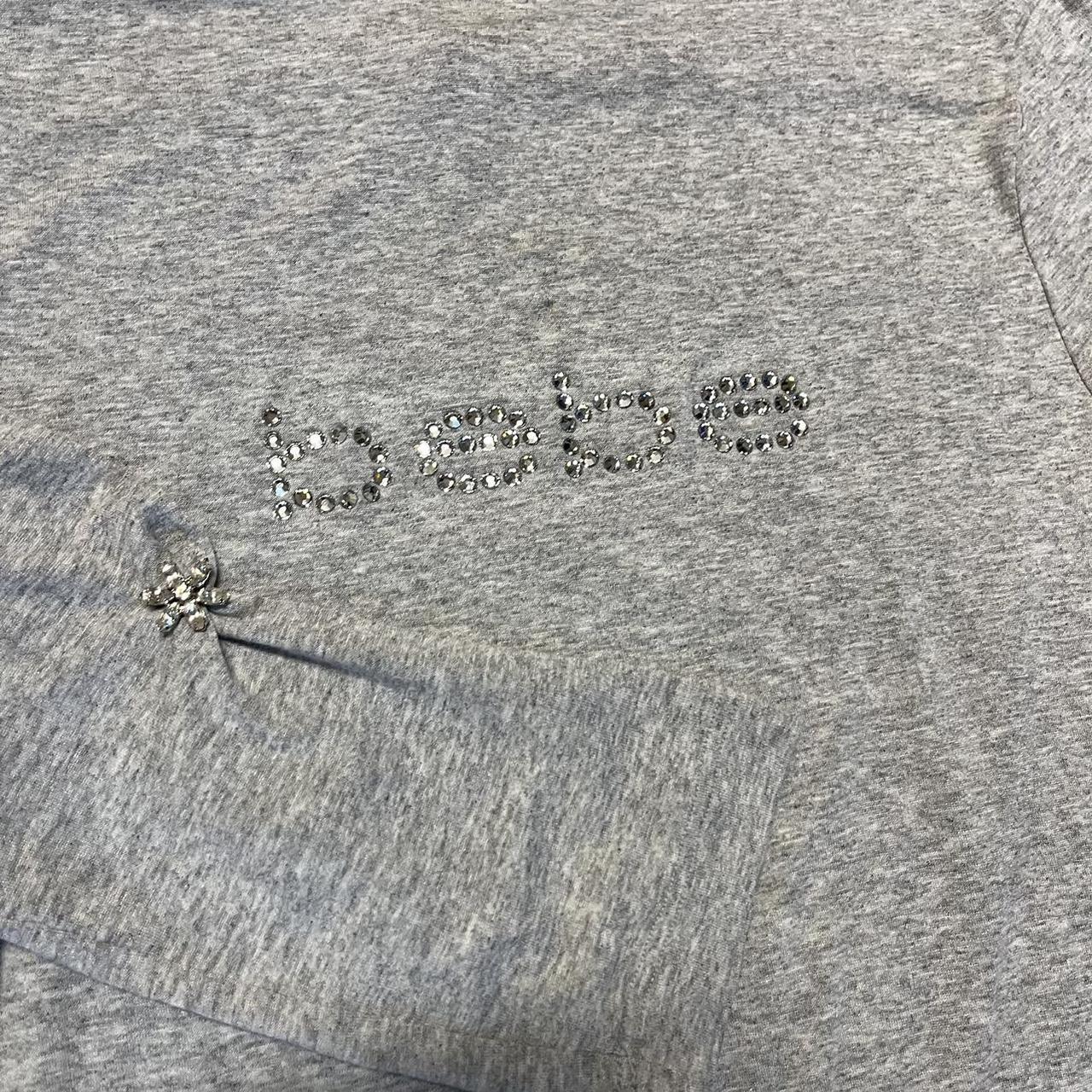 Gray bebe made in USA rhinestone 3/4 sleeve... - Depop