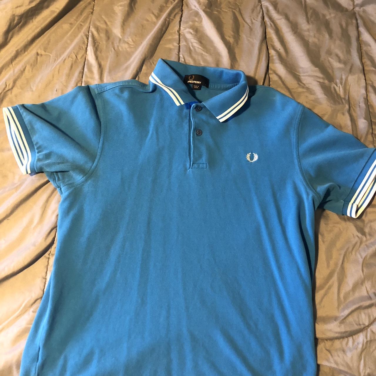 Light blue Fred Perry polo, size small, fits medium - Depop