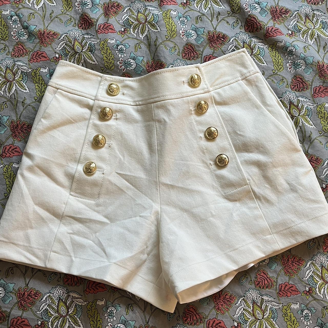 Wide leg white shorts with gold buttons. Great for a... - Depop