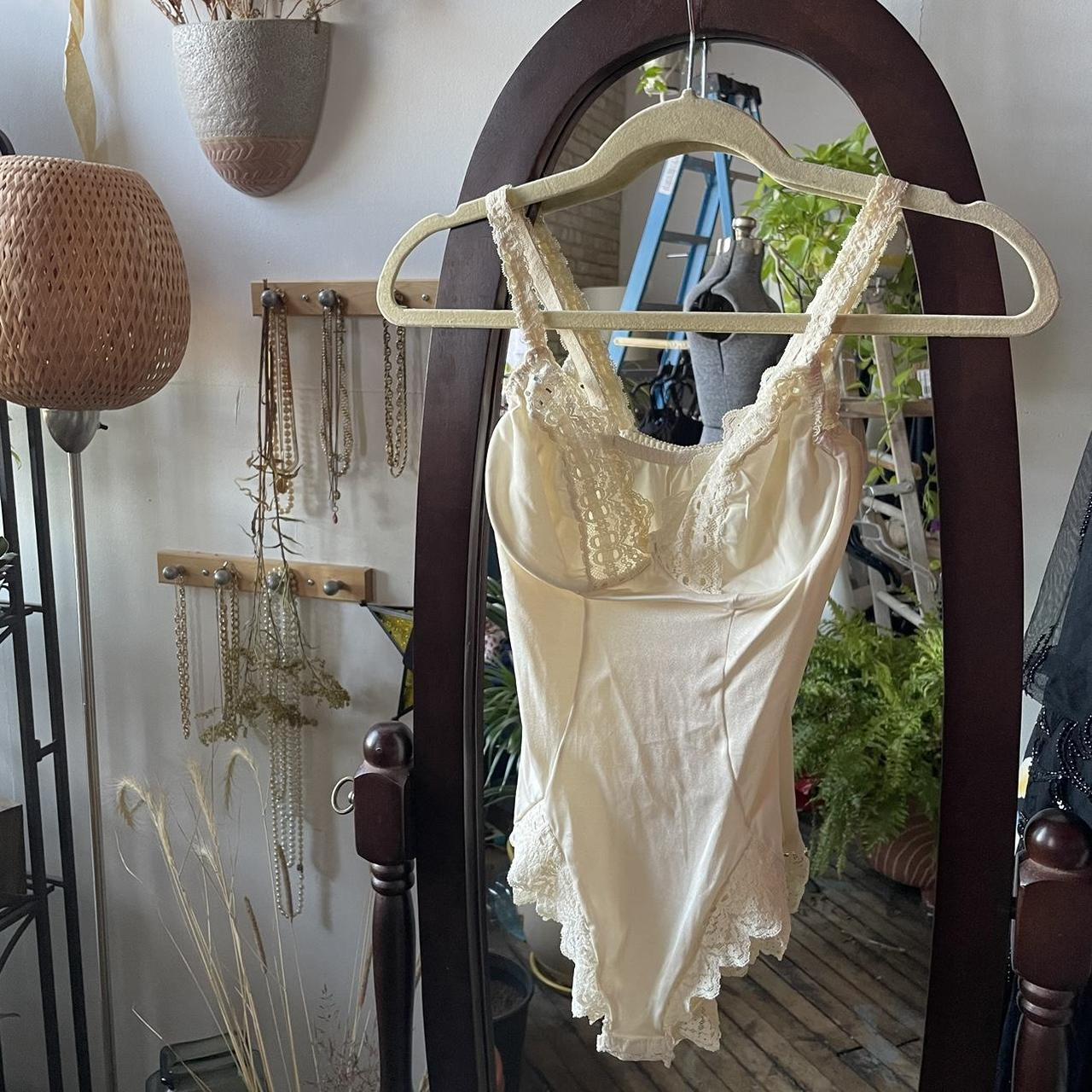 Olga Women's Cream and Tan Bodysuit | Depop