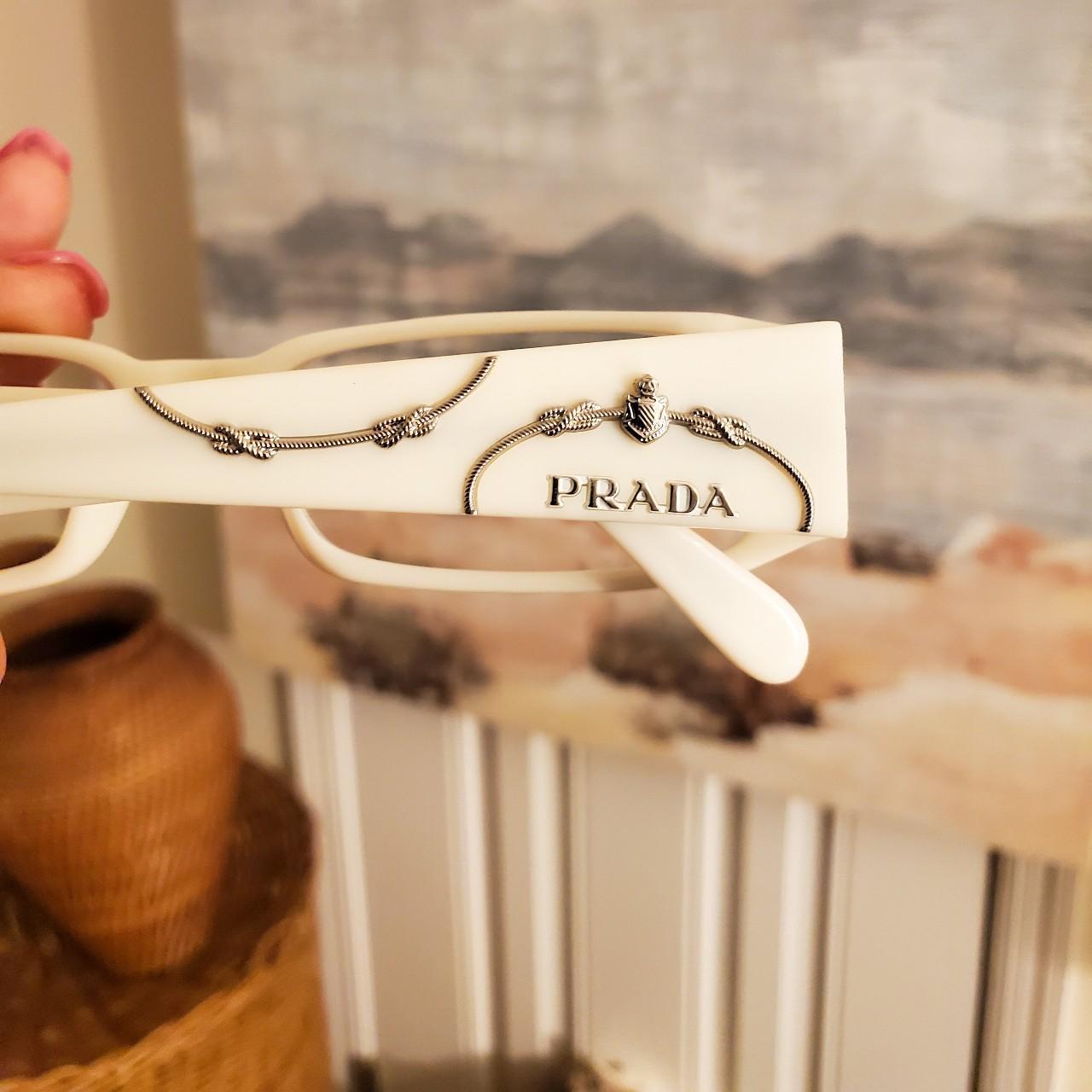 Prada Women's White and Silver Sunglasses | Depop