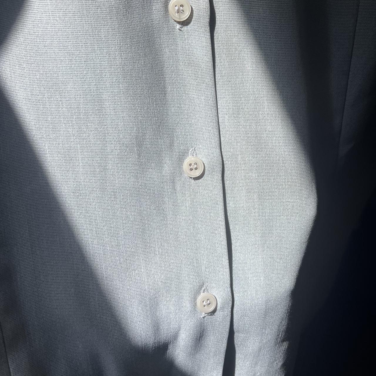 Light blue/grey button up shirt with a relaxed fit... - Depop