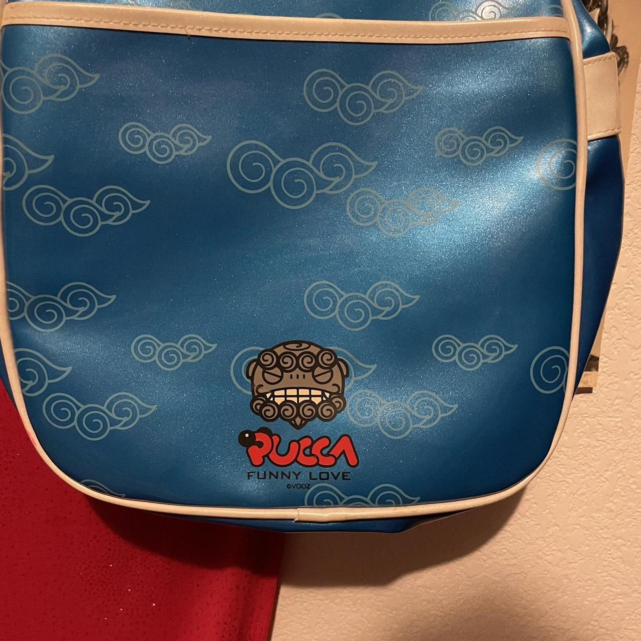 Official Pucca pvc glossy glittery messenger bag.... - Depop