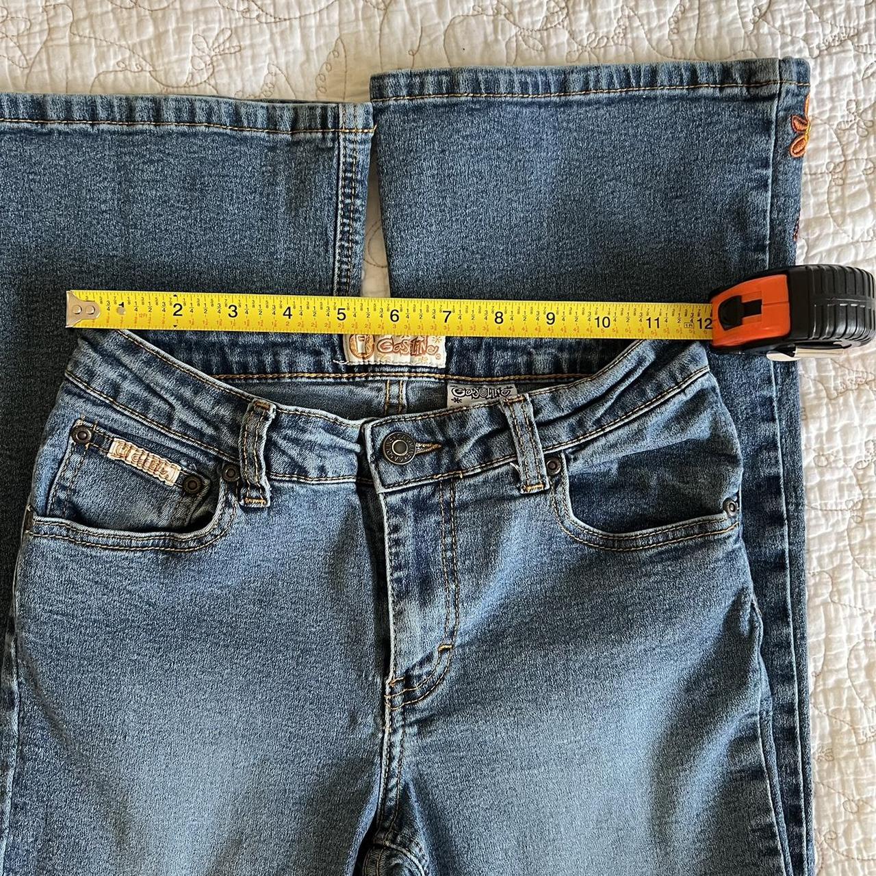 gasoline denim jeans with orange floral embroidery... - Depop