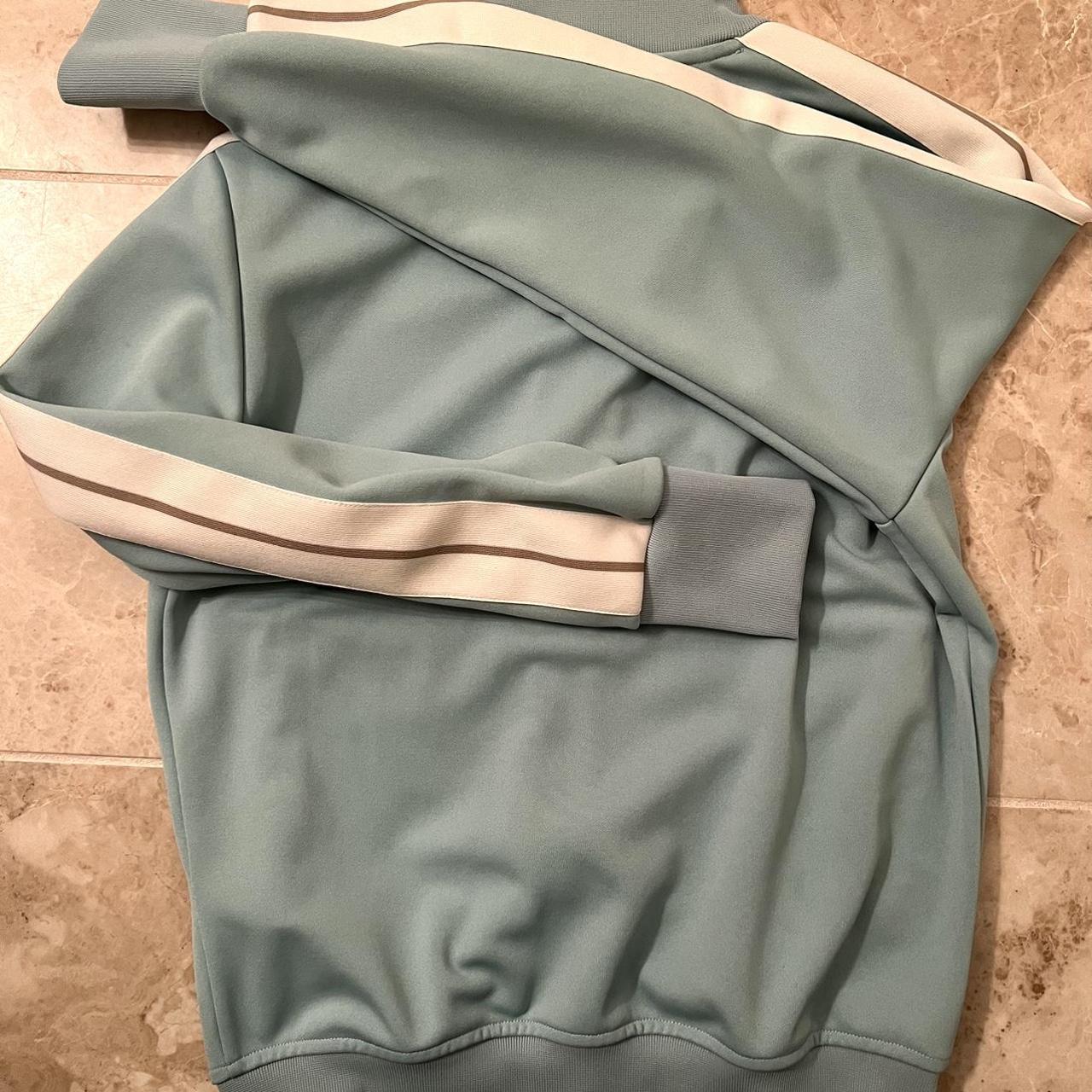 palm angels light blue track jacket w/ gold stripe... - Depop