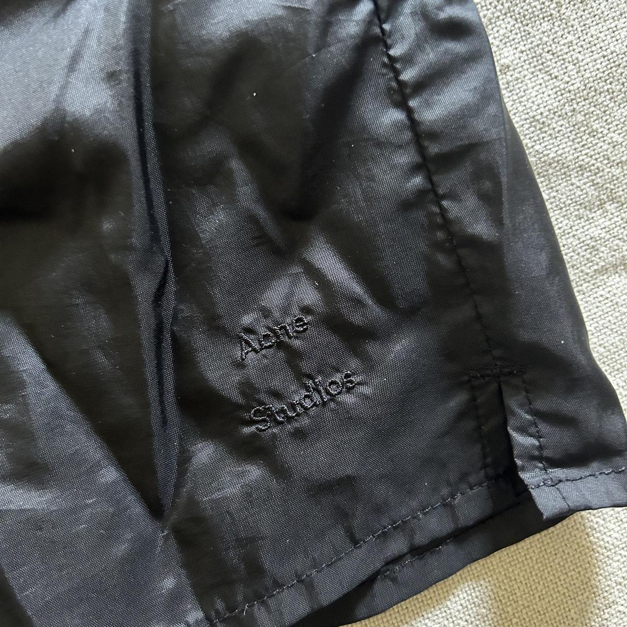 - All black Acne Studios Nylon swim shorts - Elastic... - Depop