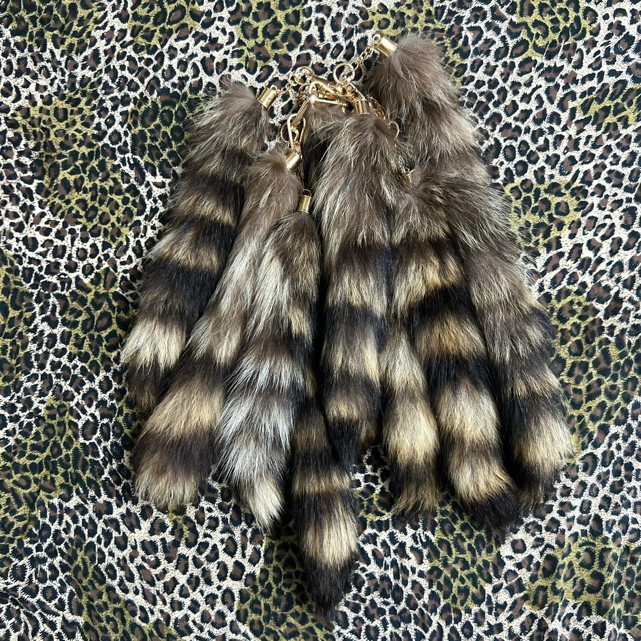 real raccoon fur tail keychain listing is for one... - Depop